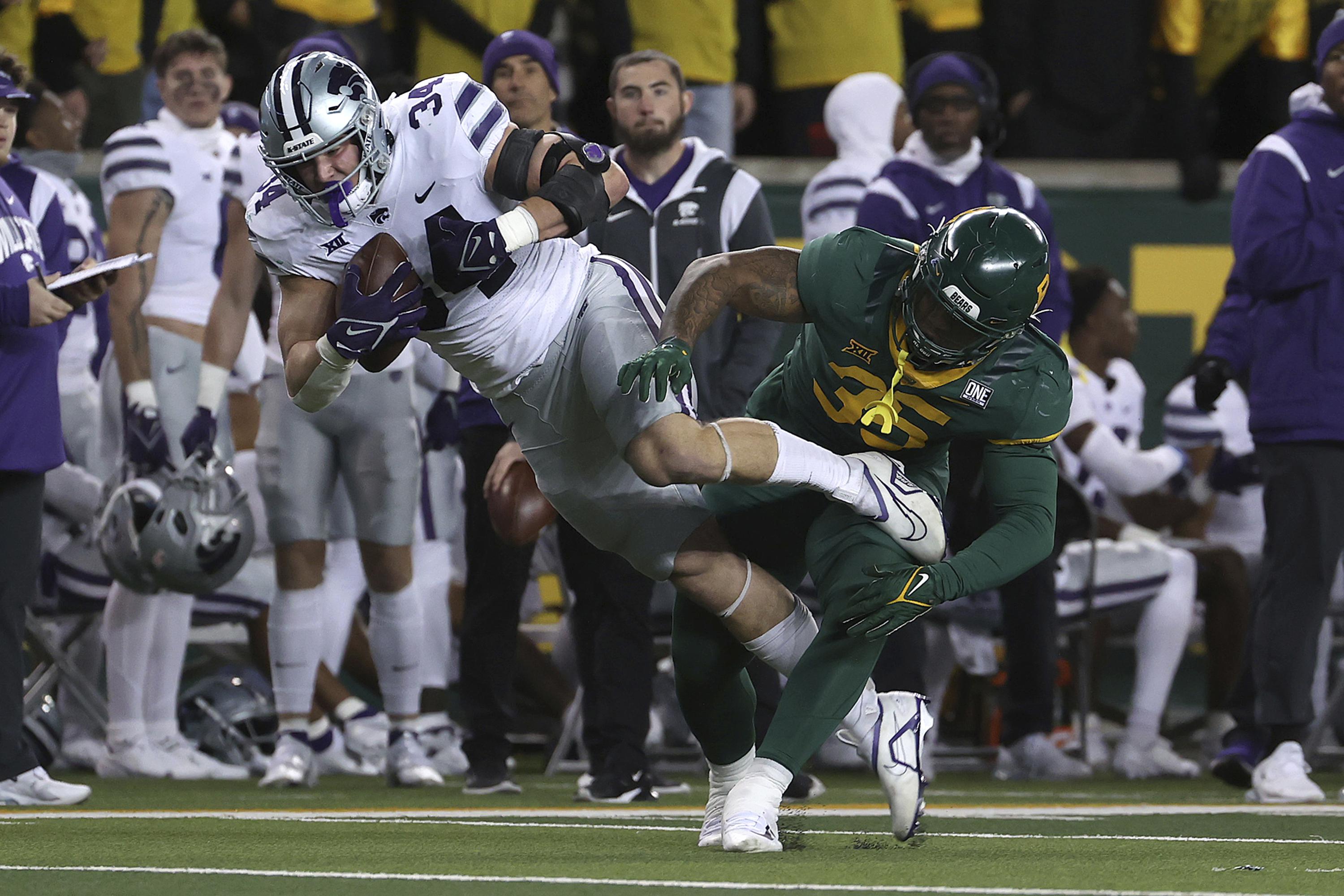 Super sub Howard leads No. 23 K-State to 31-3 rout of Baylor | AP News