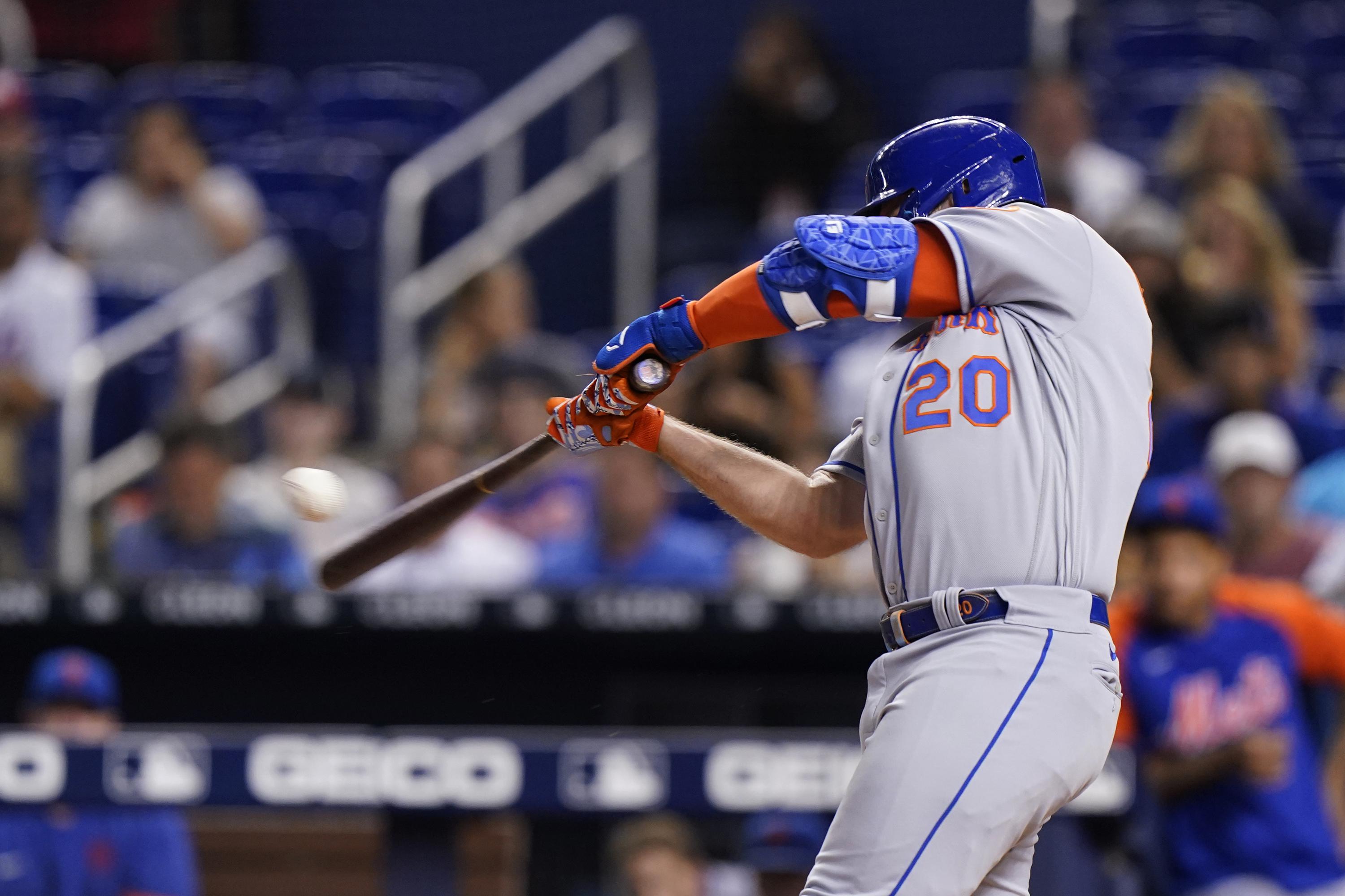 Alonso homers twice, including 100th, as Mets top Marlins | AP News