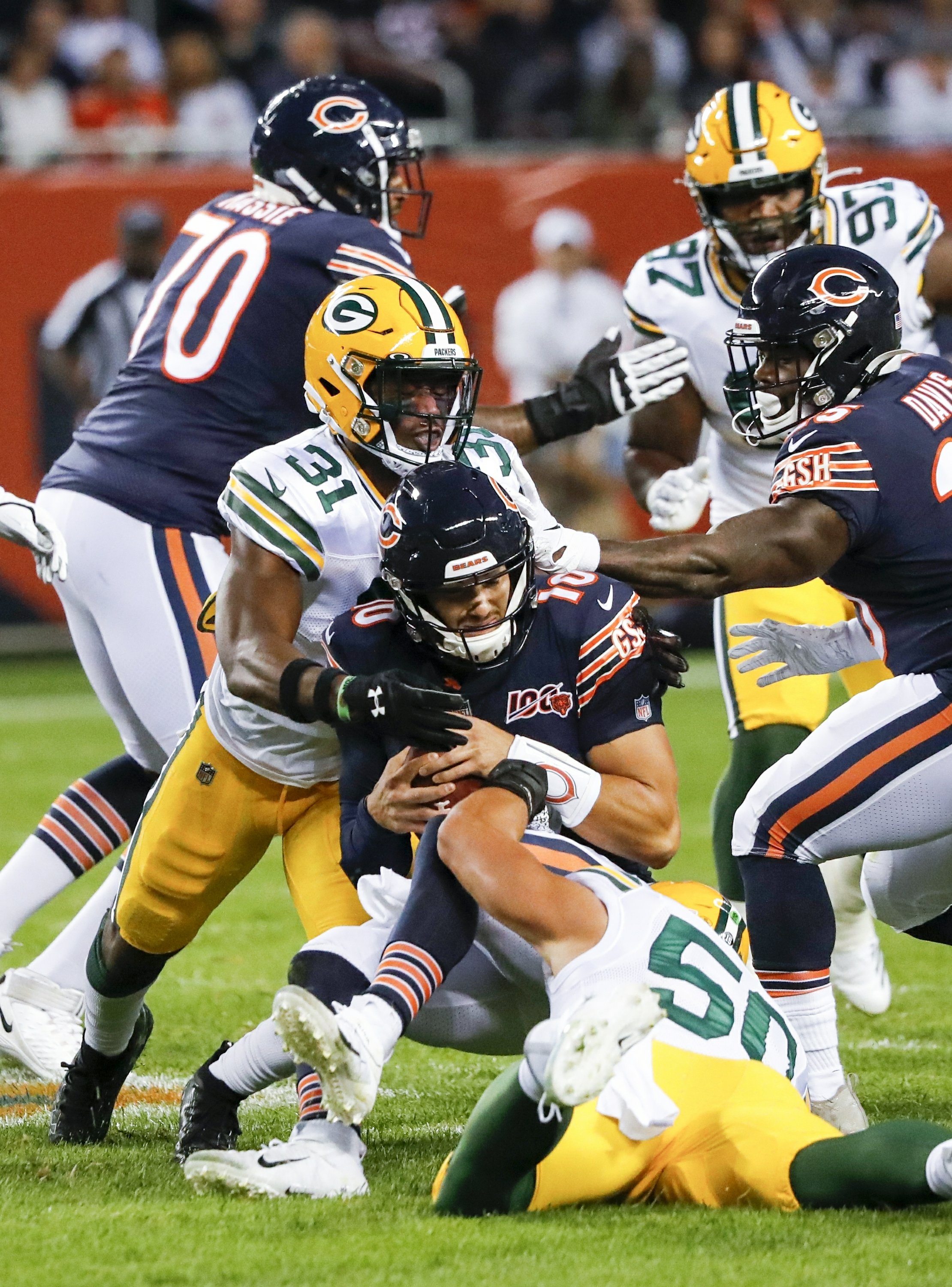 Bears' offense struggles in opening loss to Packers | AP News
