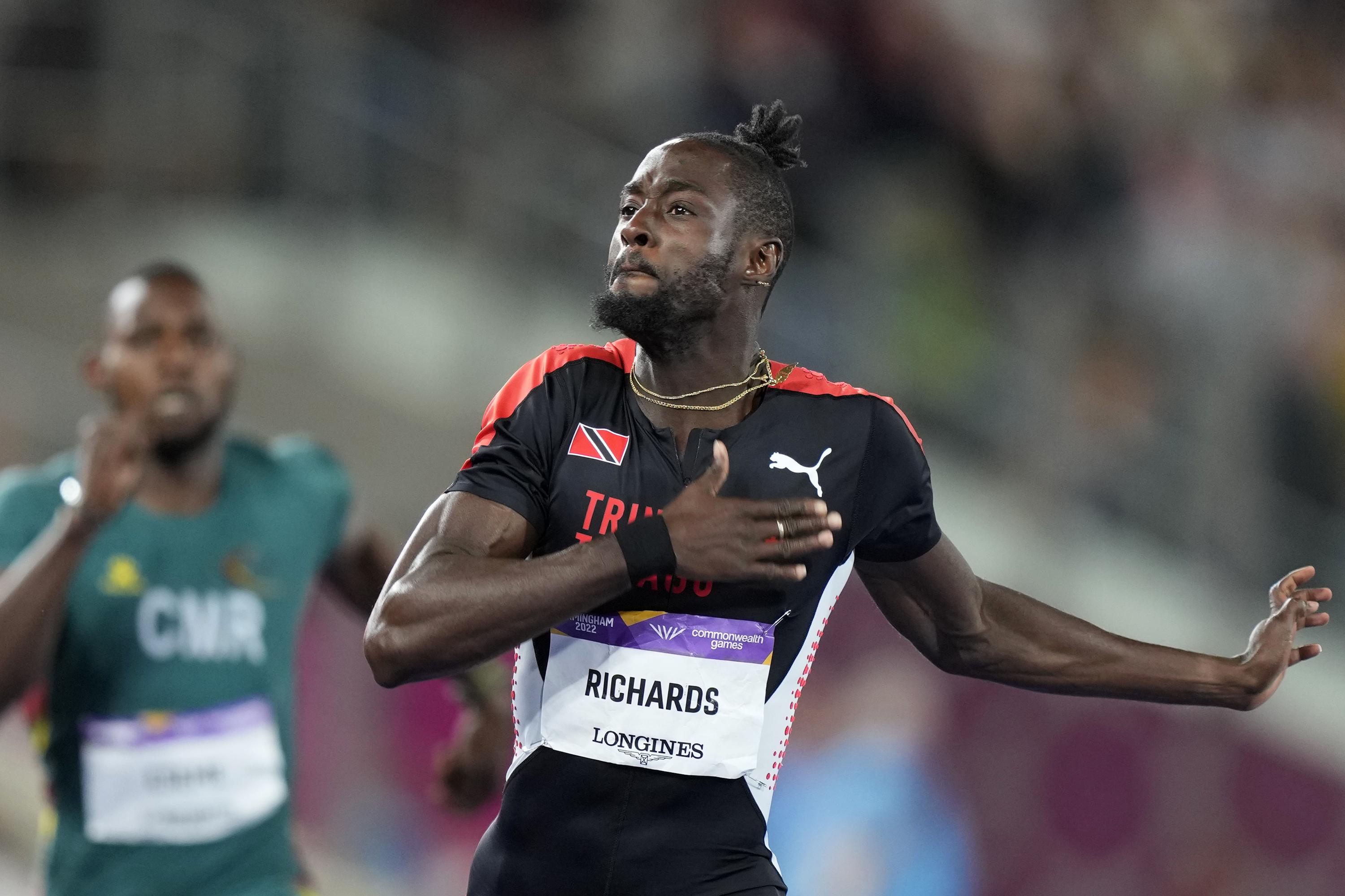 Jereem Richards follows mourning with Comm Games 200m gold | AP News