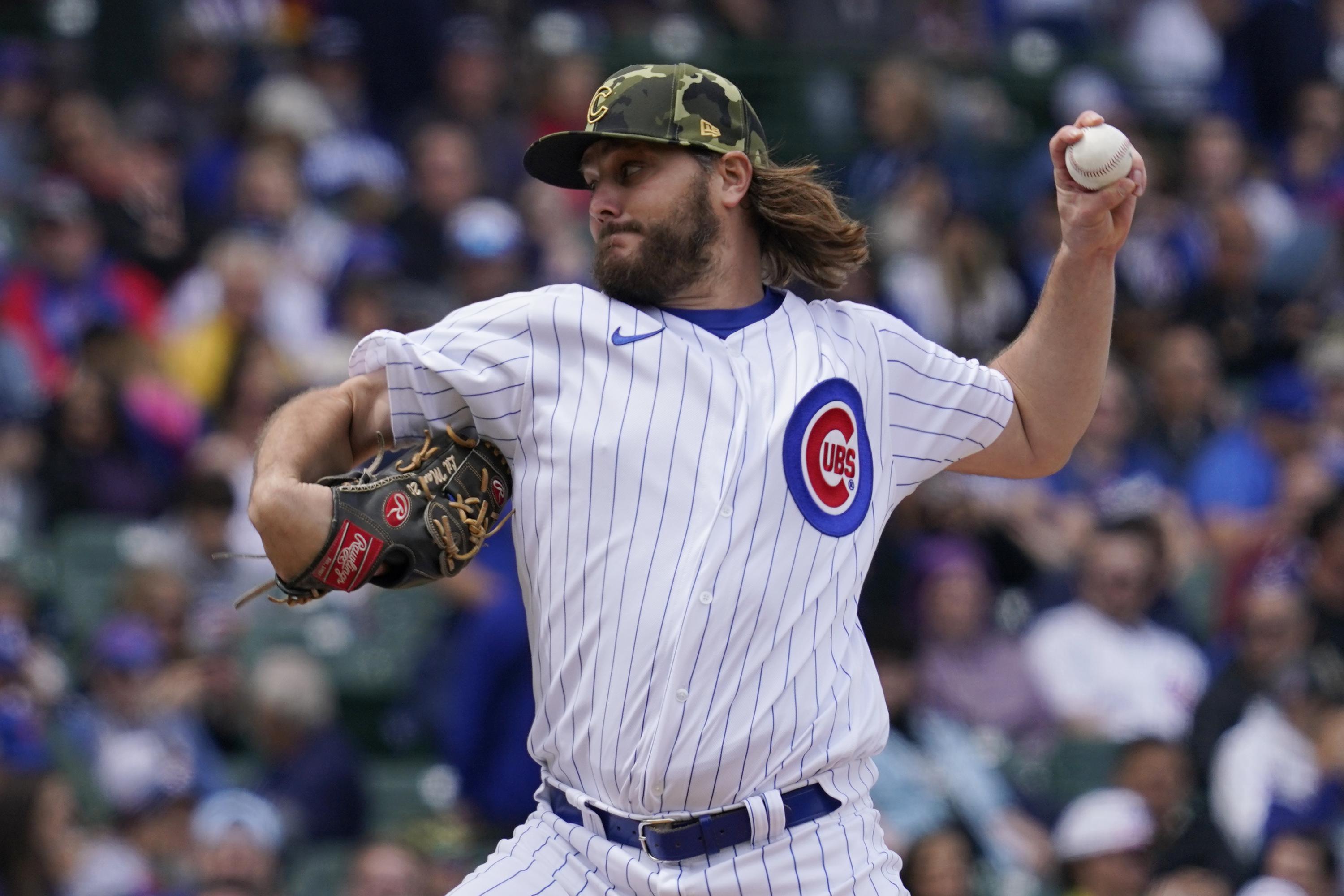 Cubs place LHP Wade Miley on 15-day IL with shoulder strain | AP News