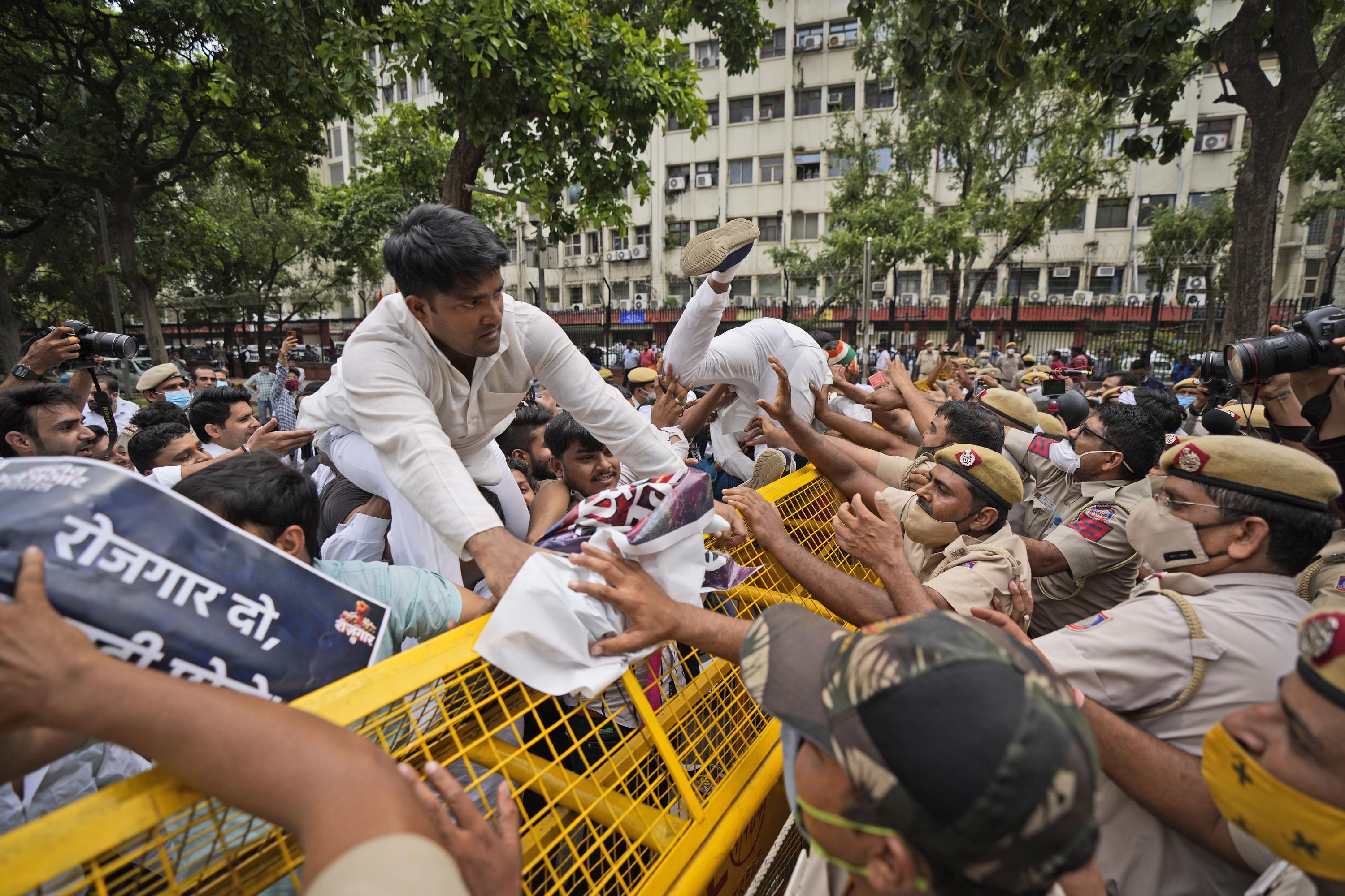 Indian opposition party holds street protest demanding jobs | AP News