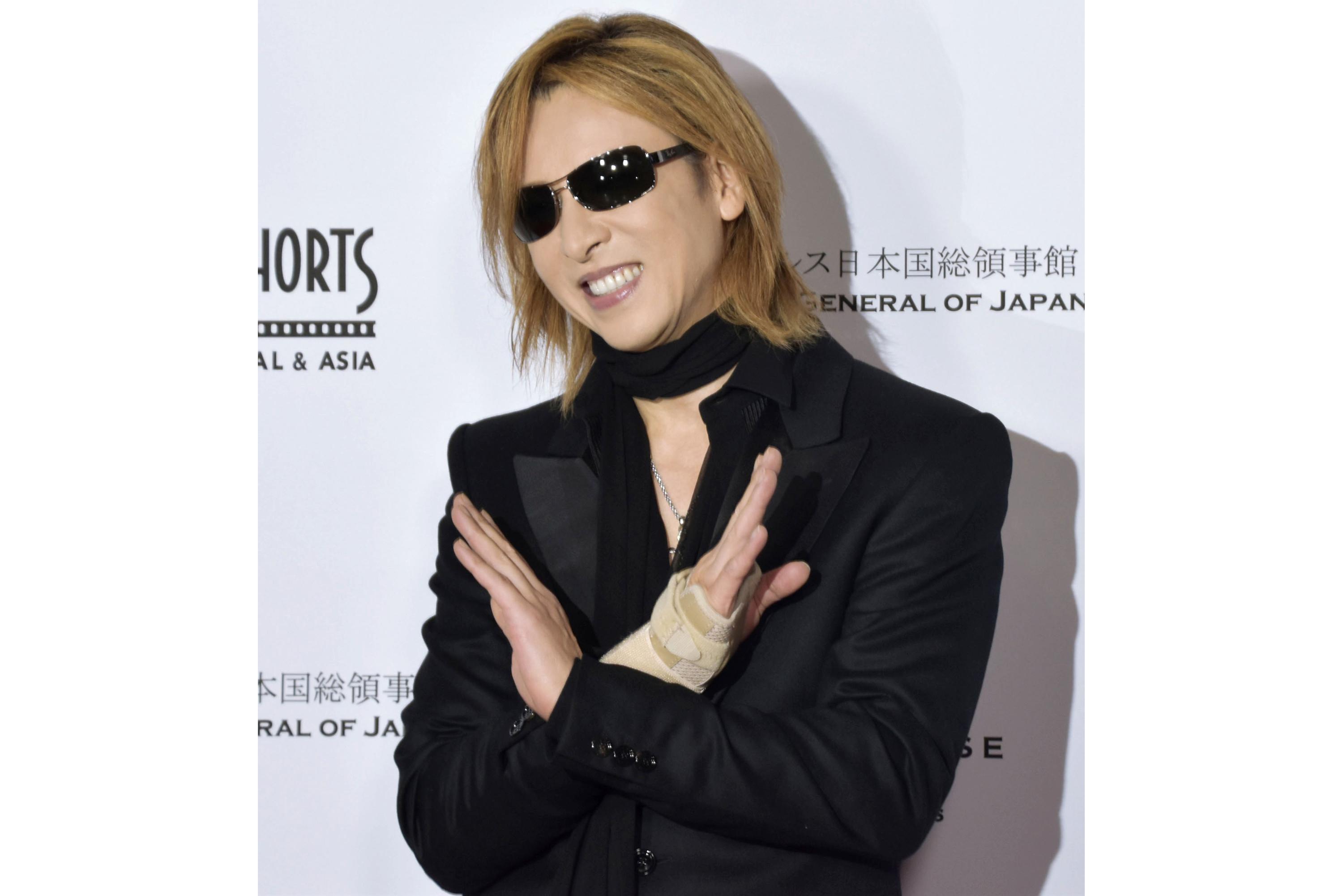 Japanese music stars form band 'to make the world rock' | AP News