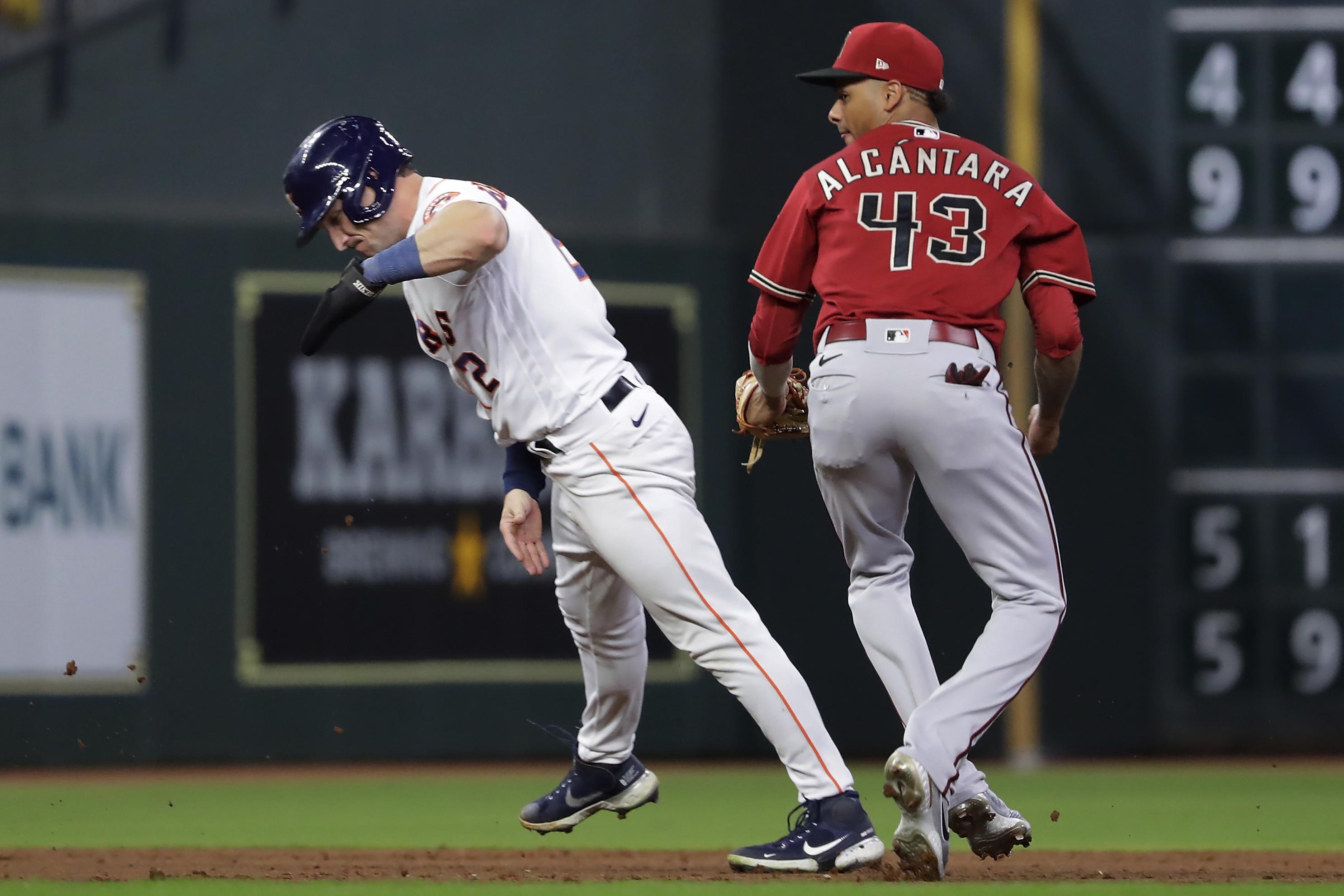 Astros lose 5-2 to Diamondbacks as Walker gets key hit | AP News