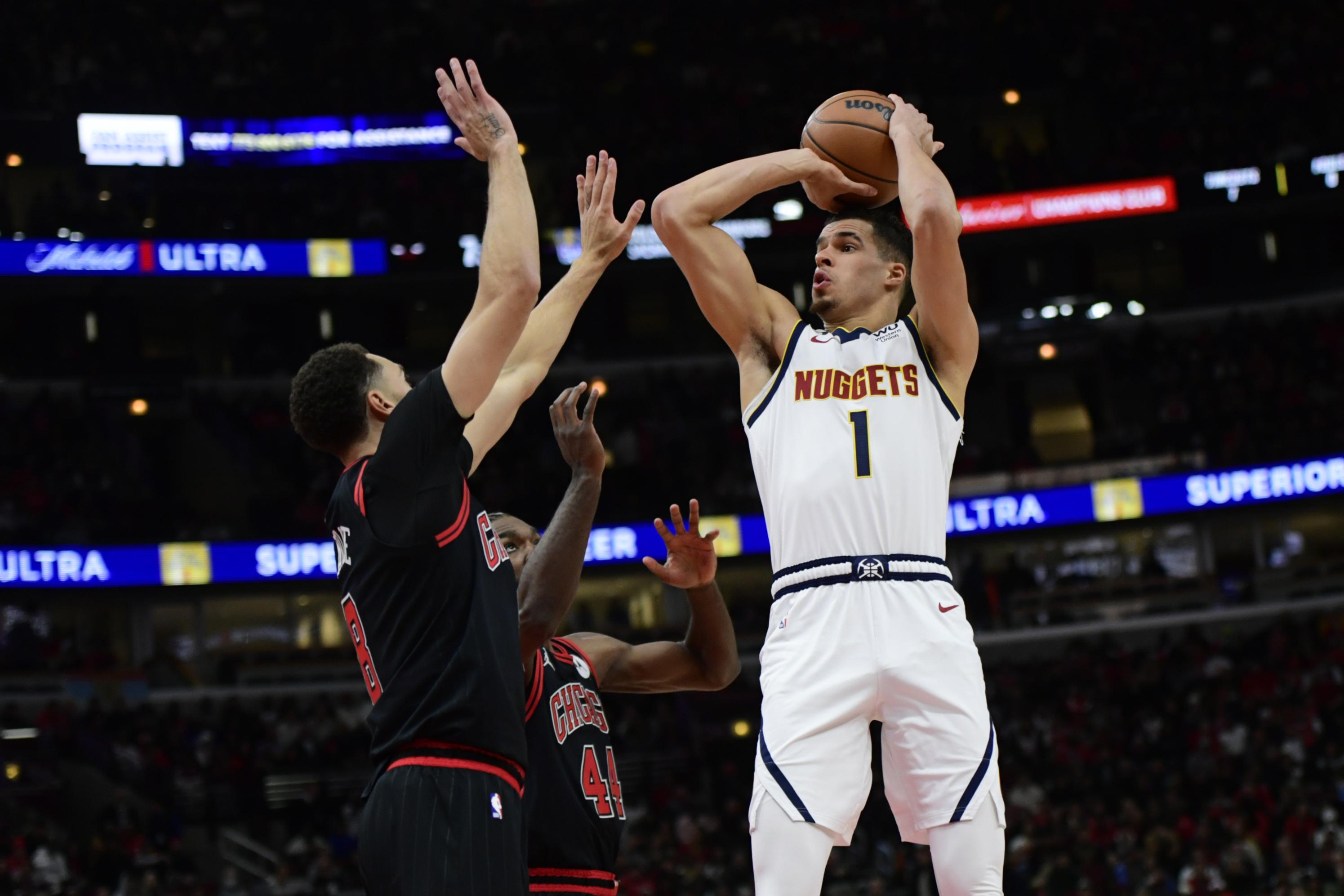 Porter anota 31 puntos y Nuggets doblegan 126-103 a Bulls | AP News