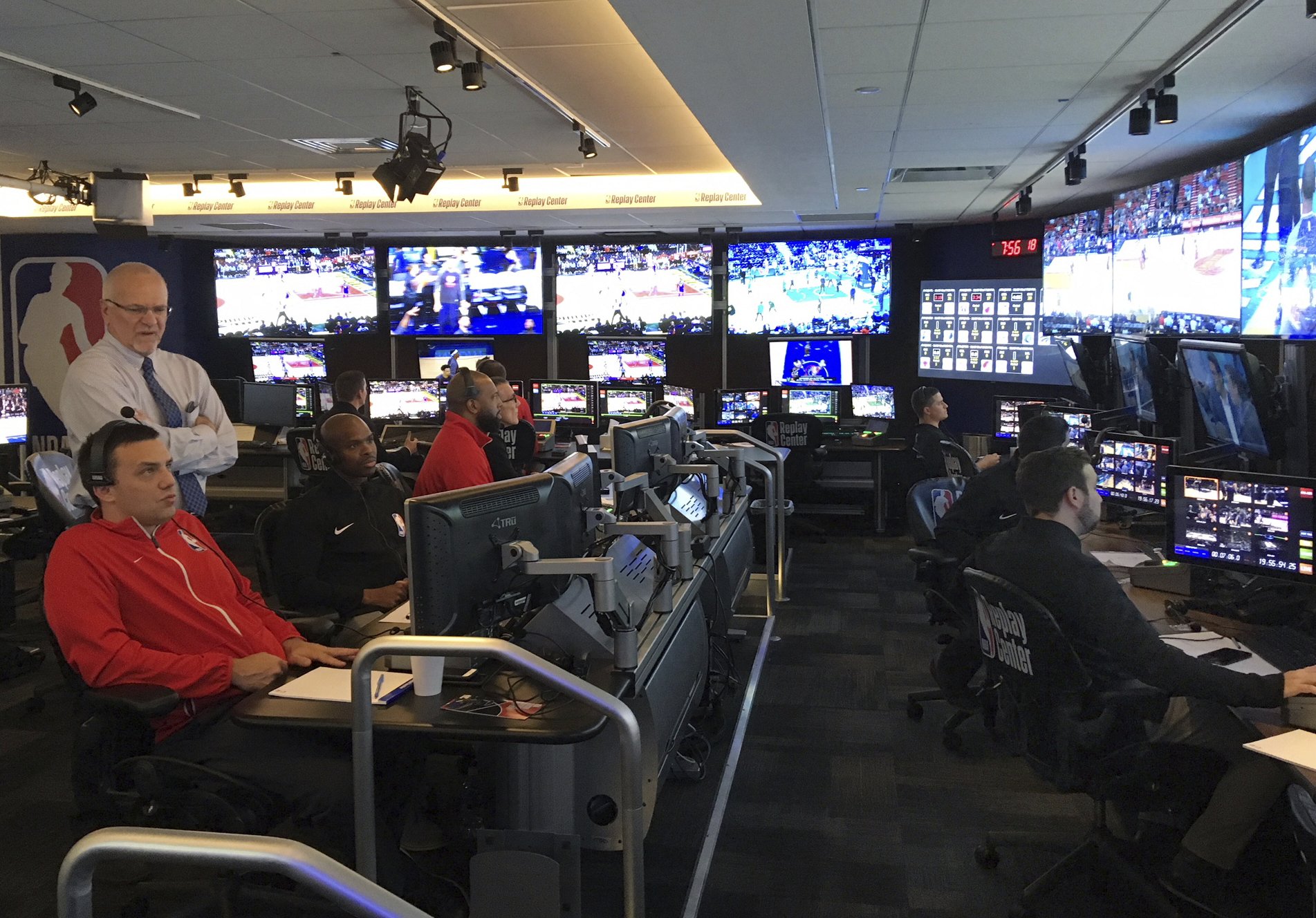 At Replay Center, NBA refs far from the game but right in it | AP News