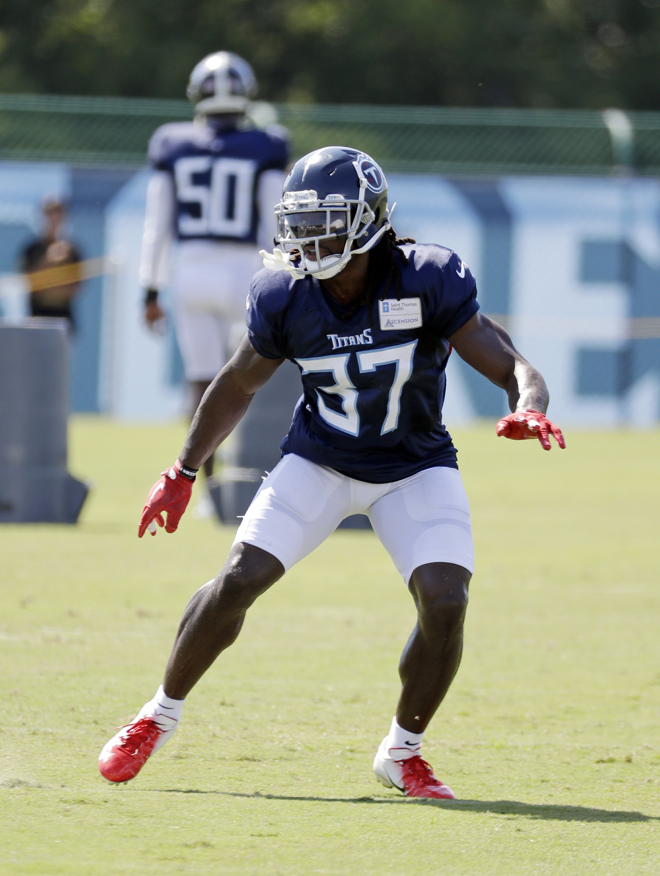 AP Source: Eric Reid among those working out Titans | AP News