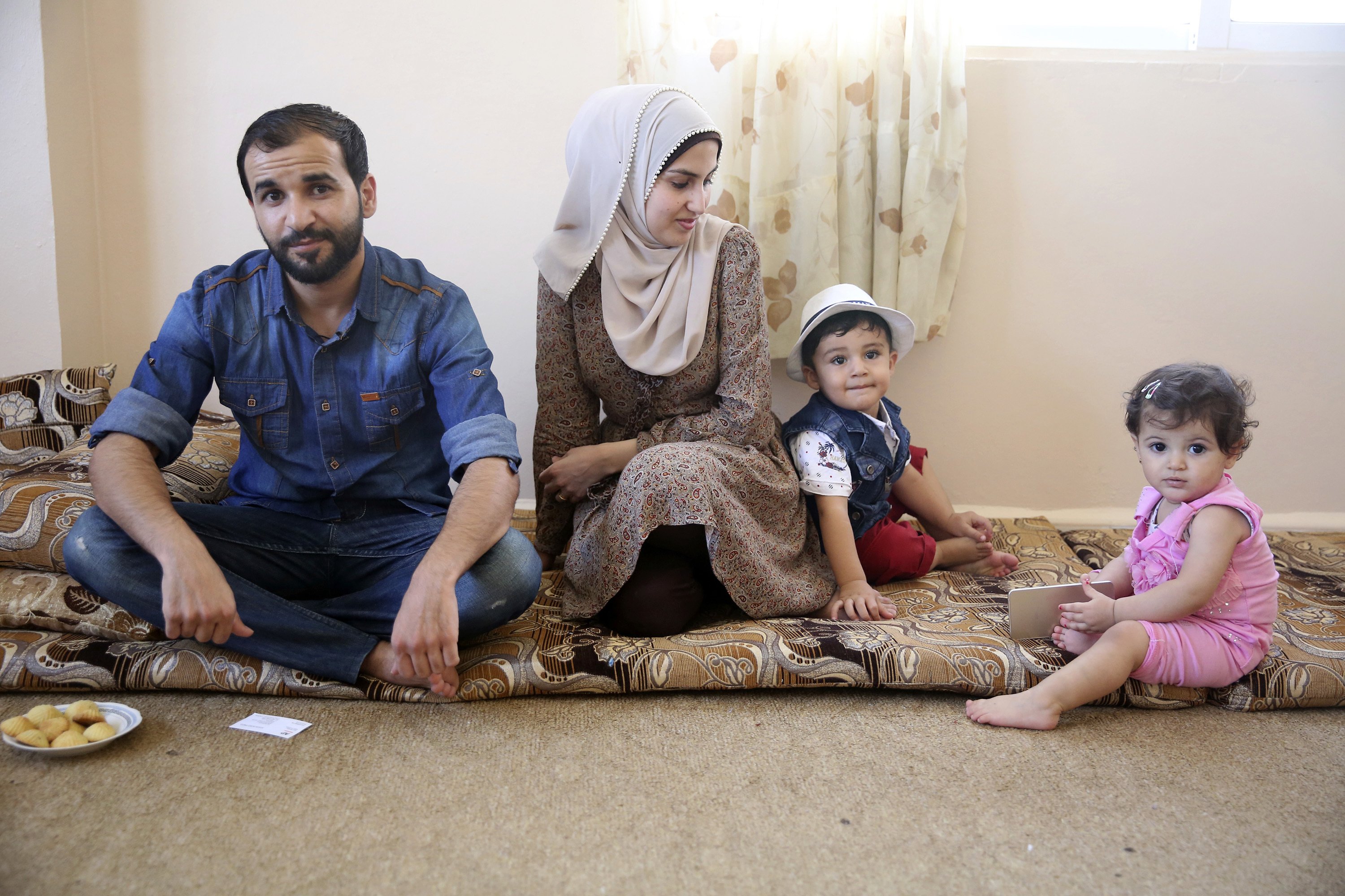 Syrian family on cusp of resettlement resigned to travel ban | AP News