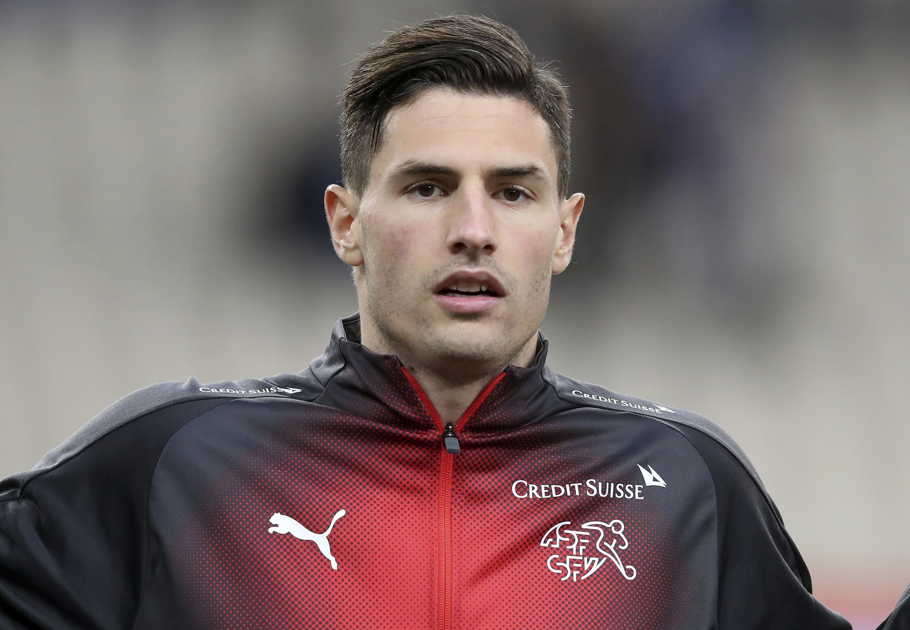 Newcastle sign Swiss defender Schar on 3-year deal | AP News