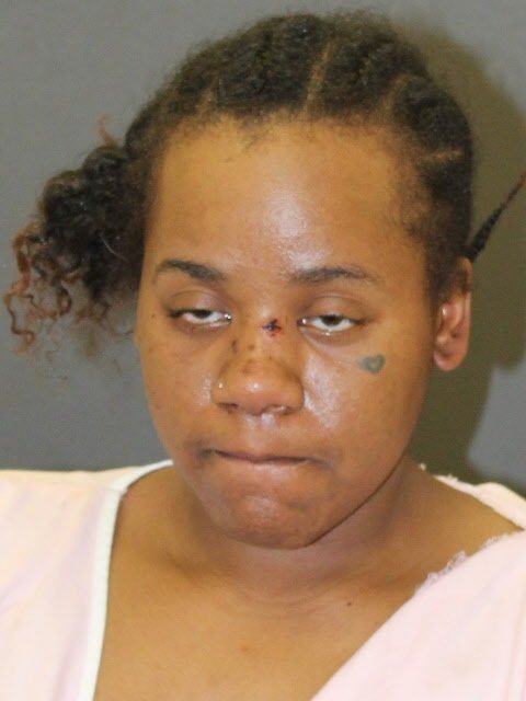 Woman arrested in Baltimore playground shooting of boy, mom | AP News