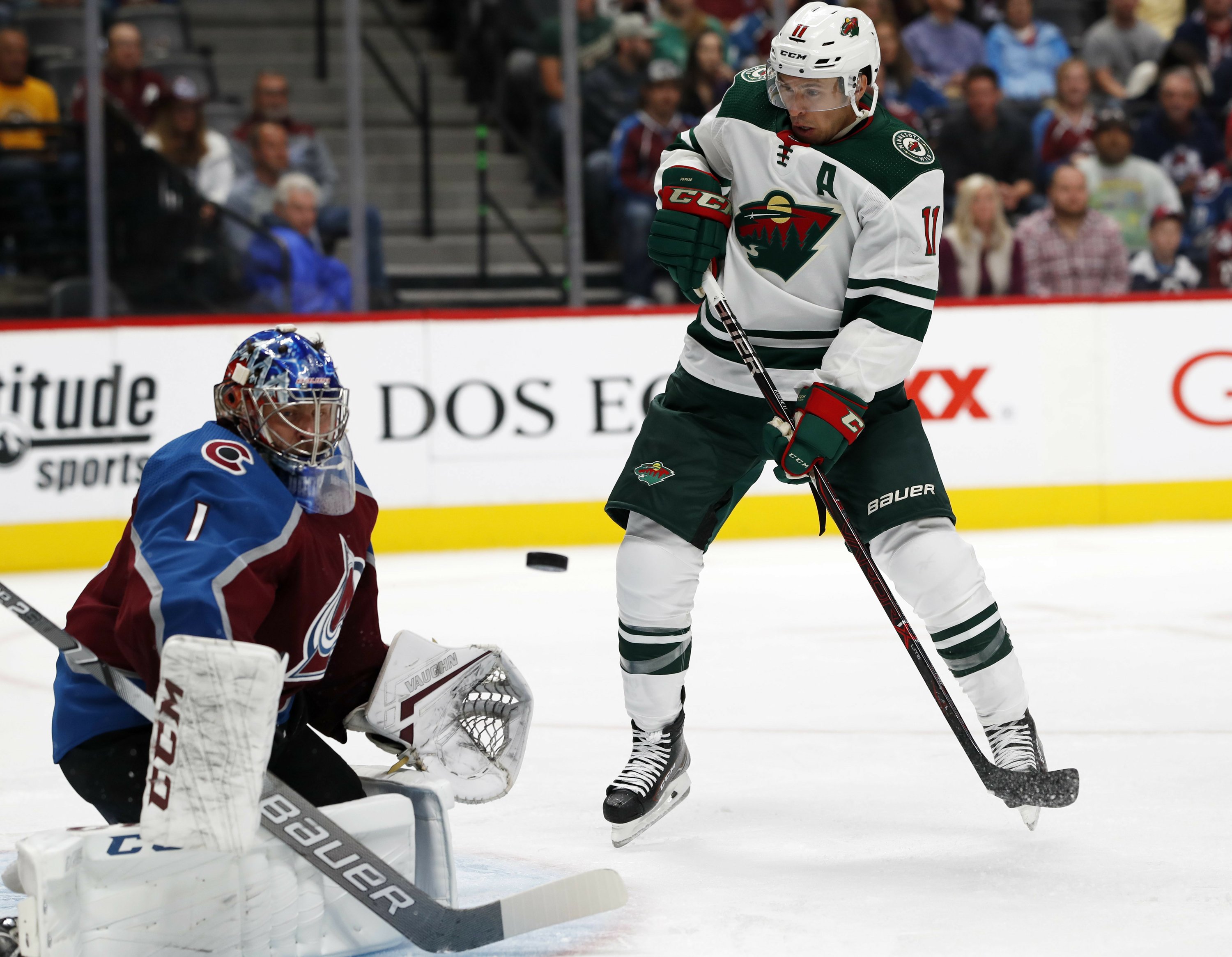MacKinnon, Rantanen help Avs to 4-1 win over Wild in opener | AP News