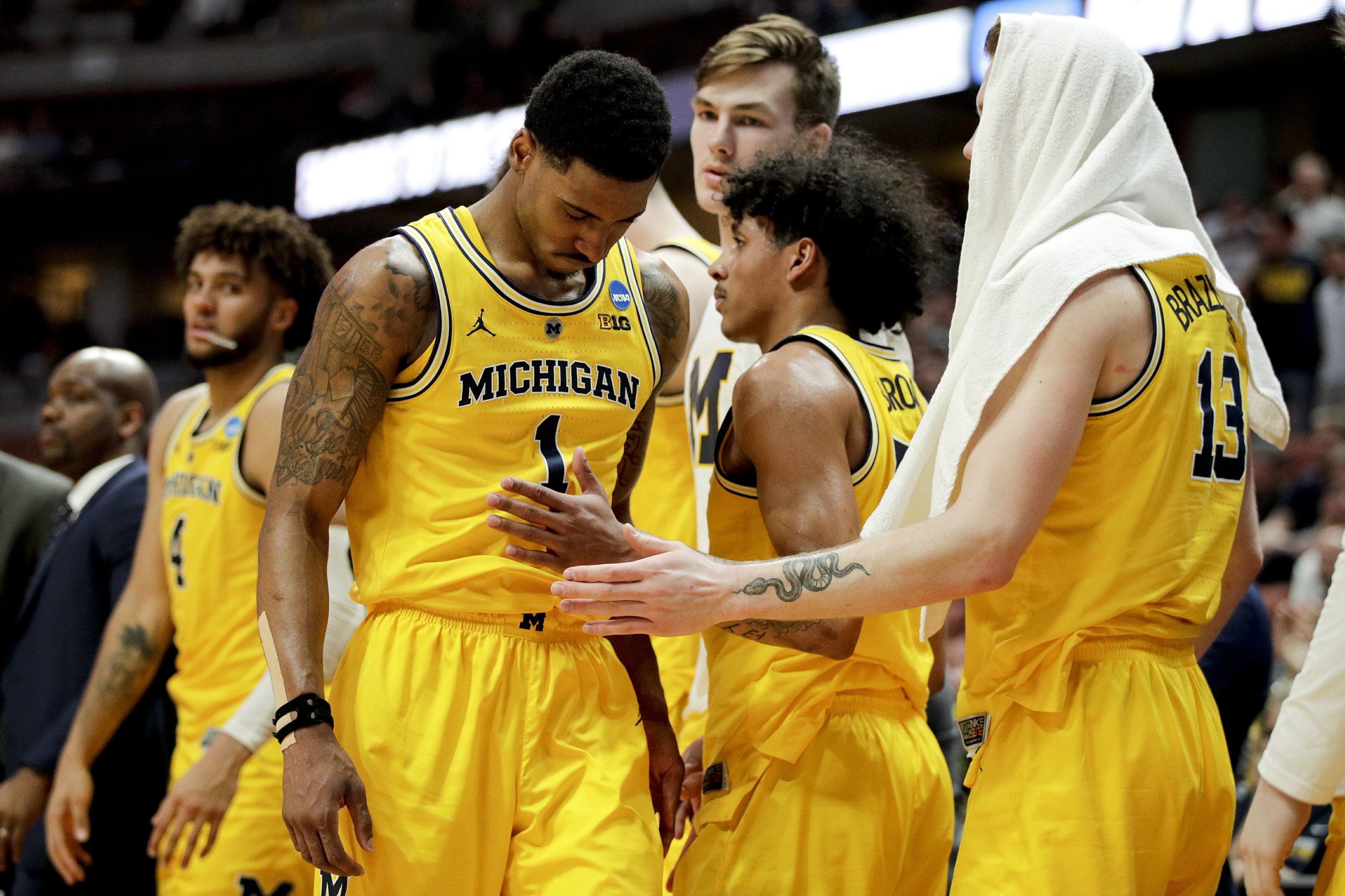Another Sweet 16 for Michigan, but no further glory | AP News