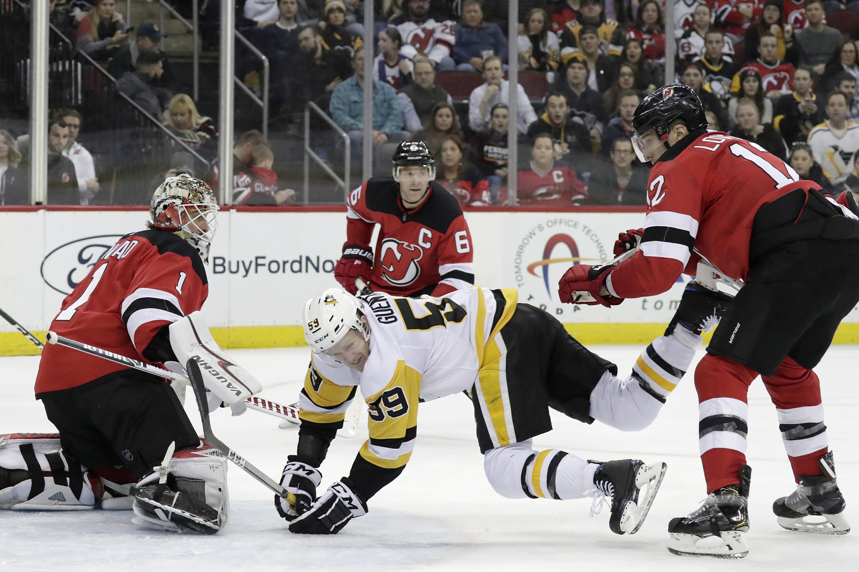 Stars acquire defenseman Lovejoy in trade with Devils | AP News