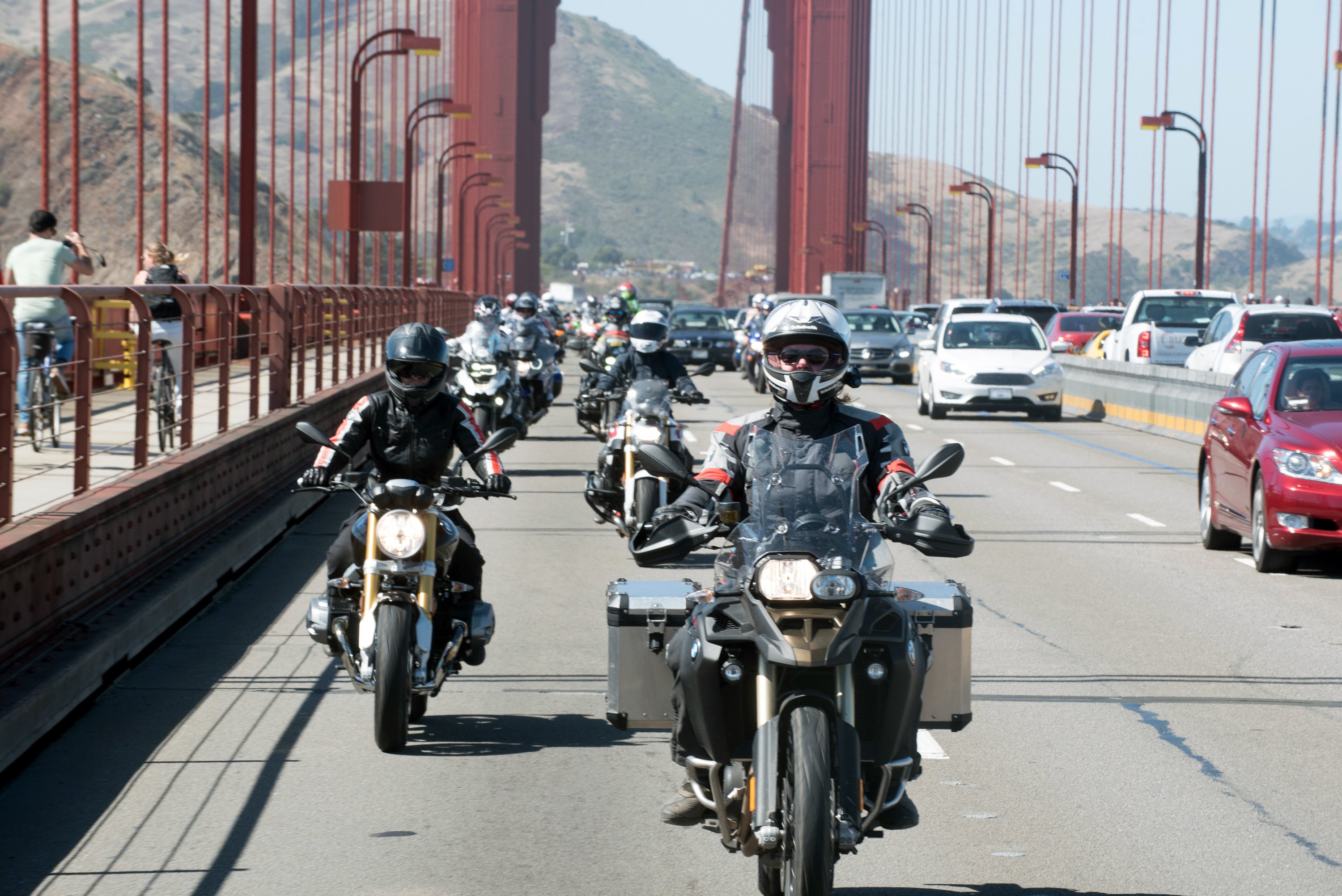 Long-distance motorcycle trips seek to empower women | AP News