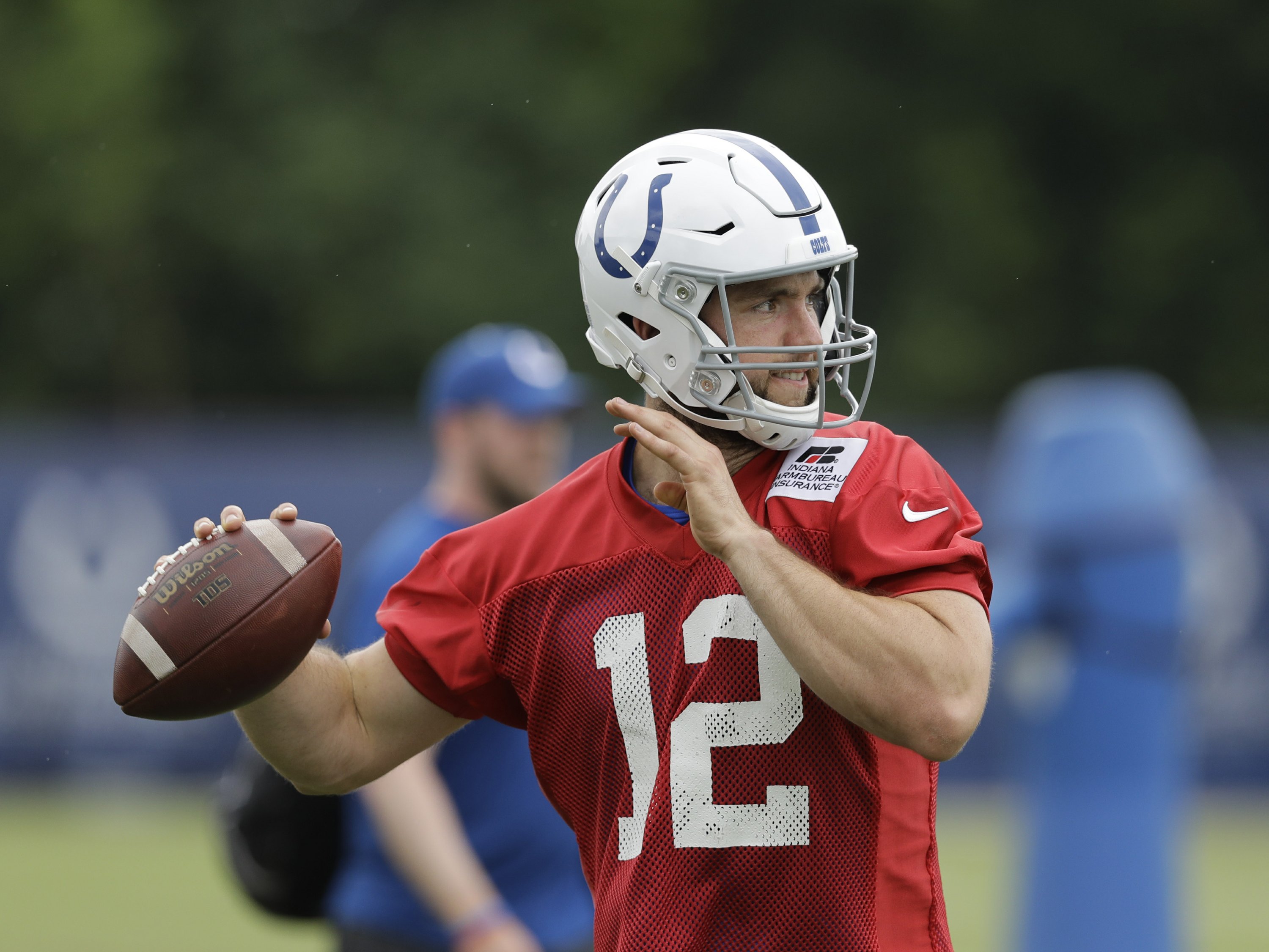 Colts will give Luck days off but no limitations on field | AP News