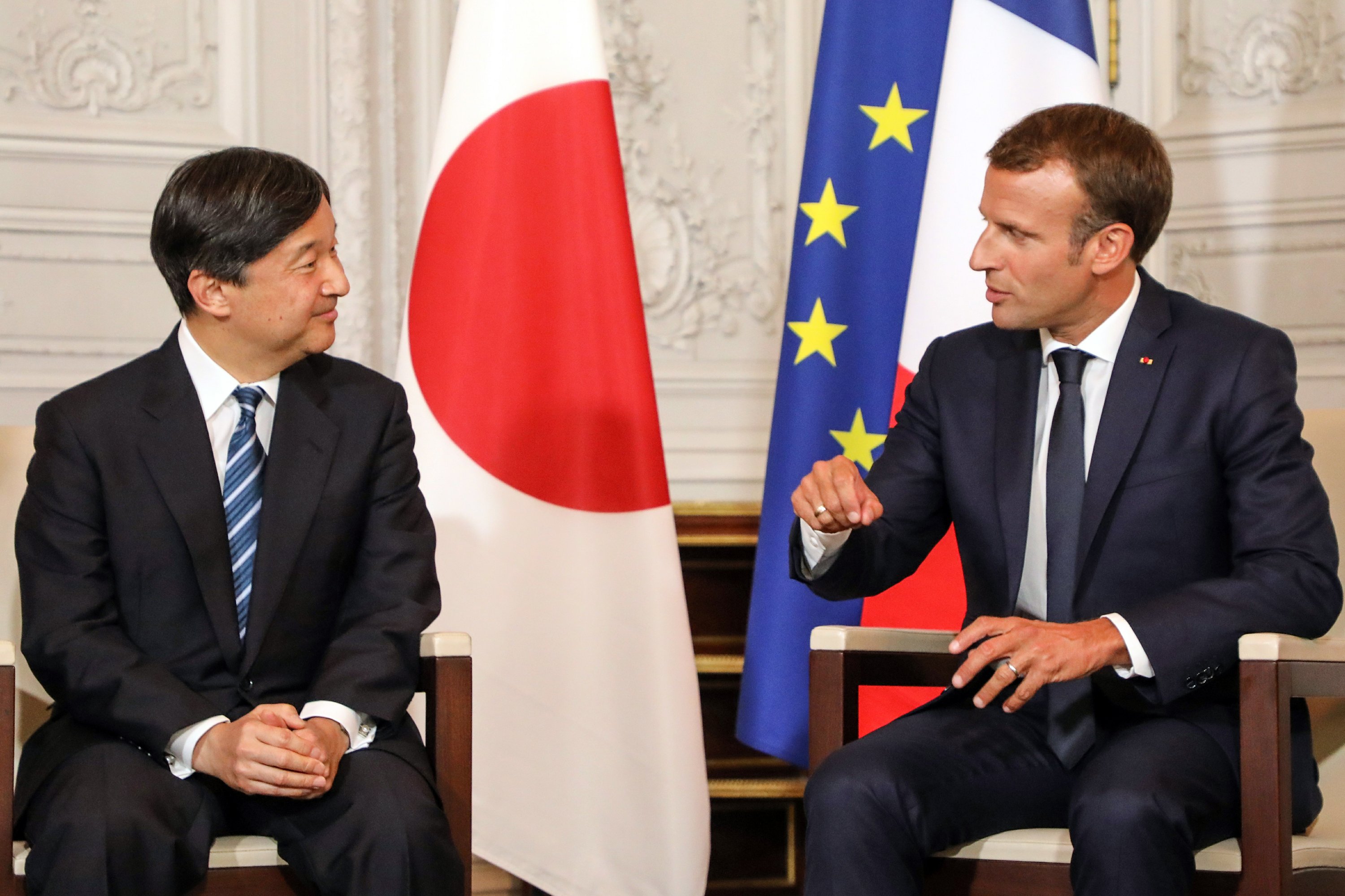 French president hosts Japanese crown prince at Versailles | AP News