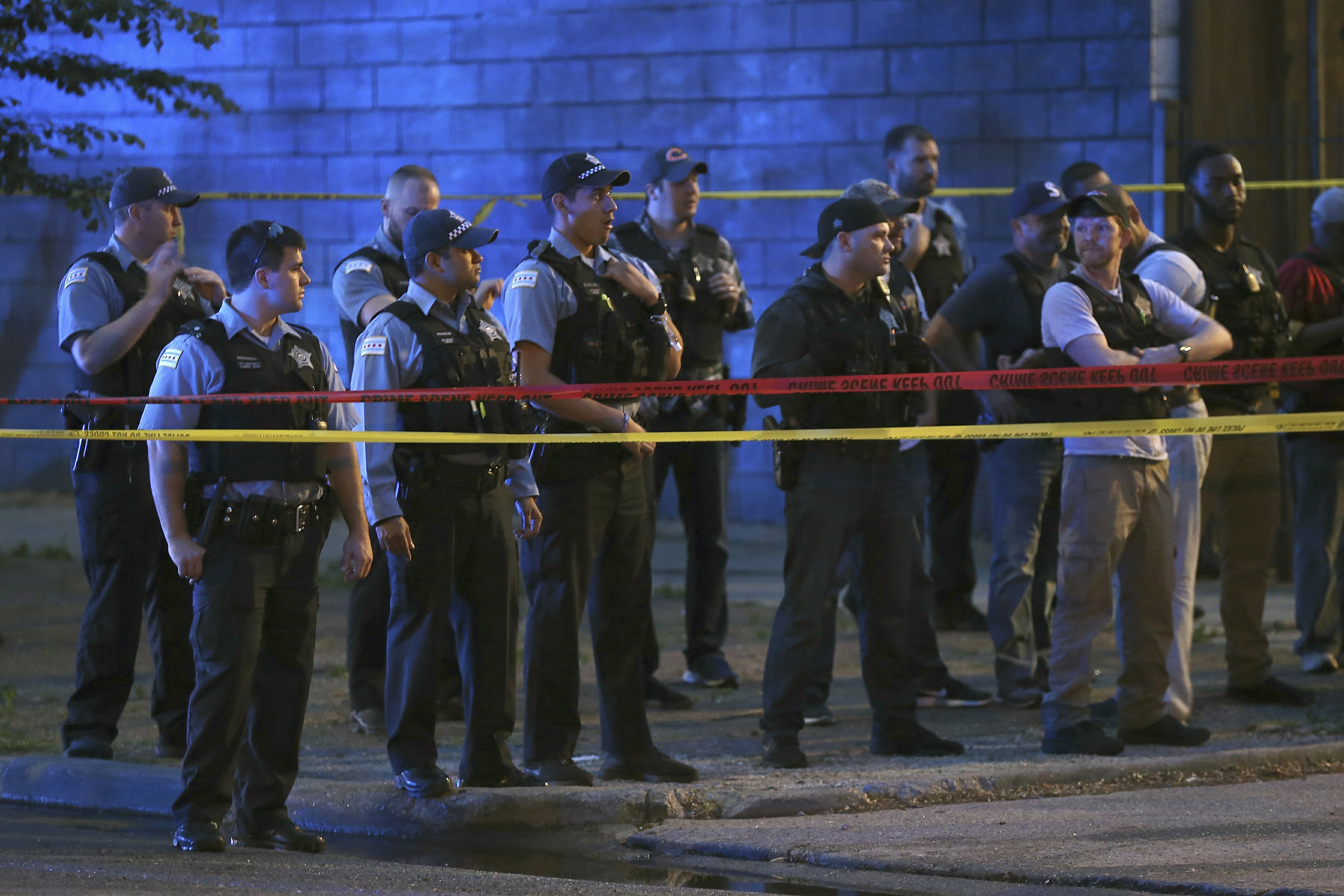 Chicago officer fatally shoots armed black man running away