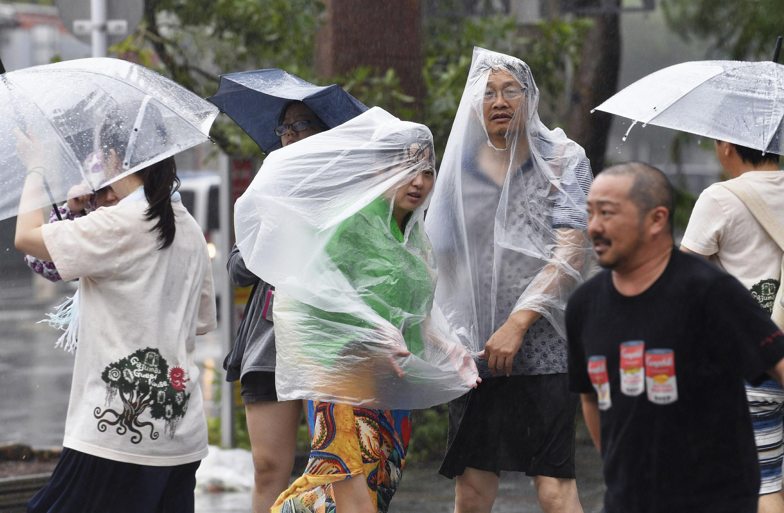 Typhoon bears down on Japan, areas hit by previous storm | AP News