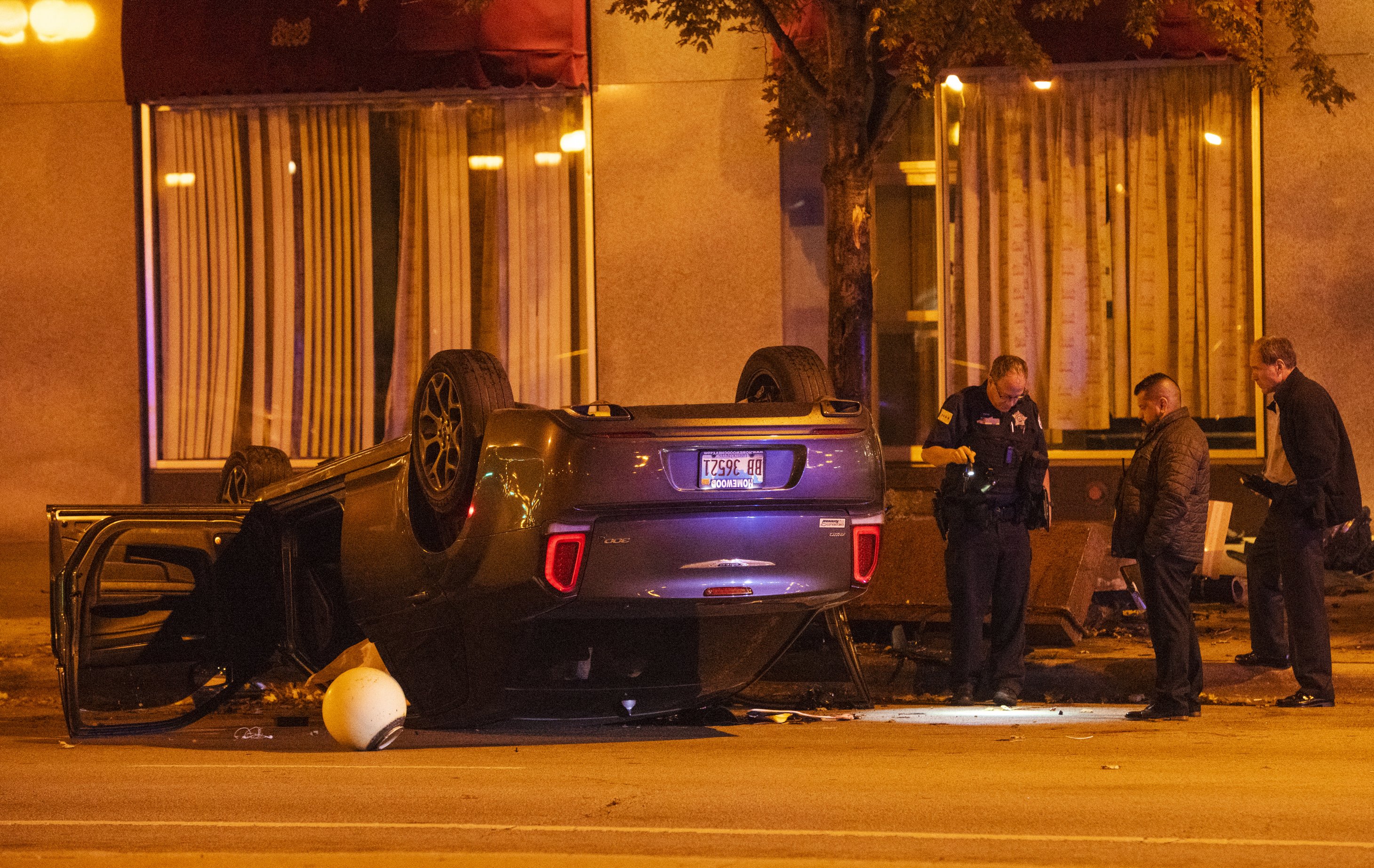 Police: Shooting inside moving car in Chicago leaves 2 dead | AP News