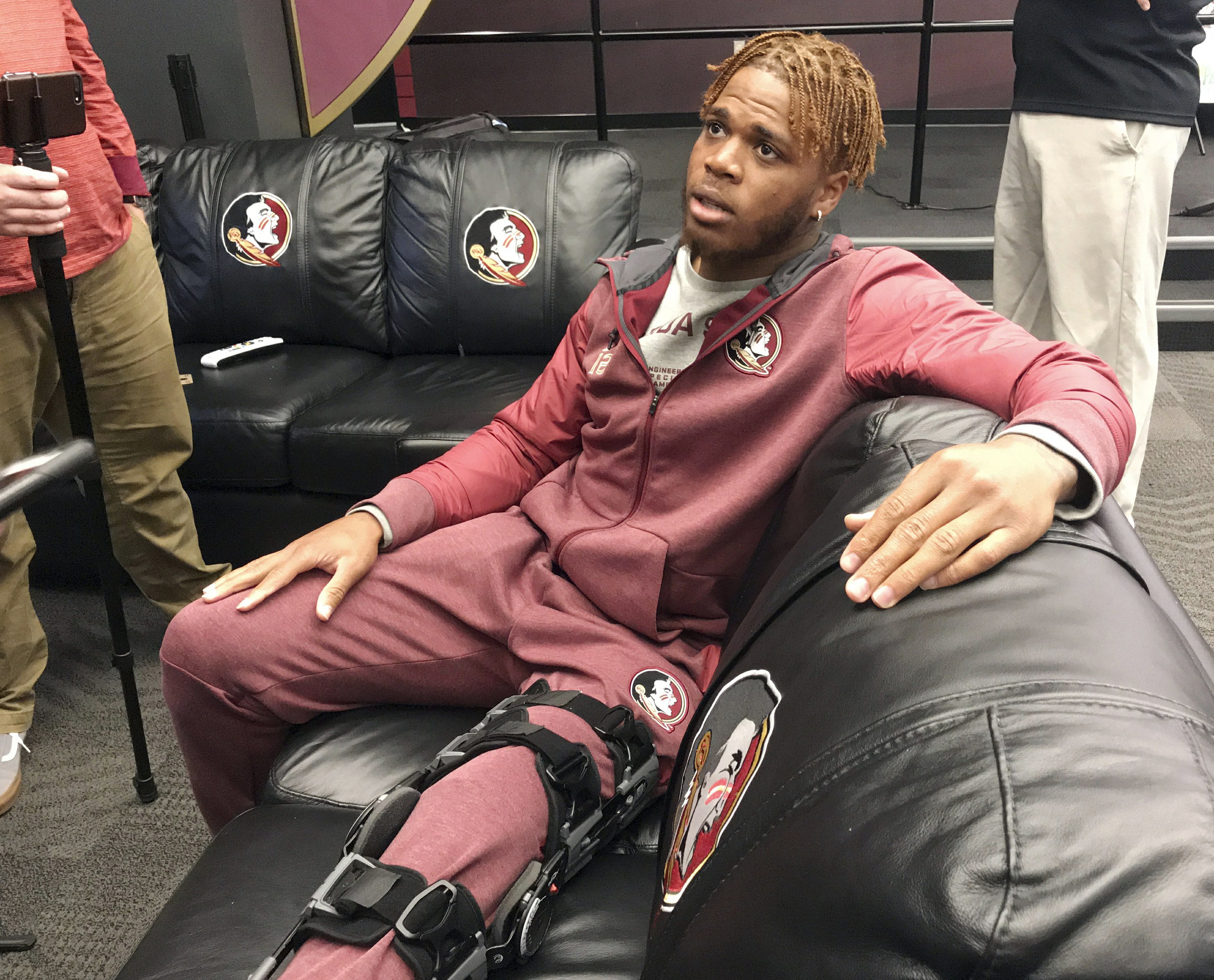 Florida State QB Francois trying to help team despite injury | AP News