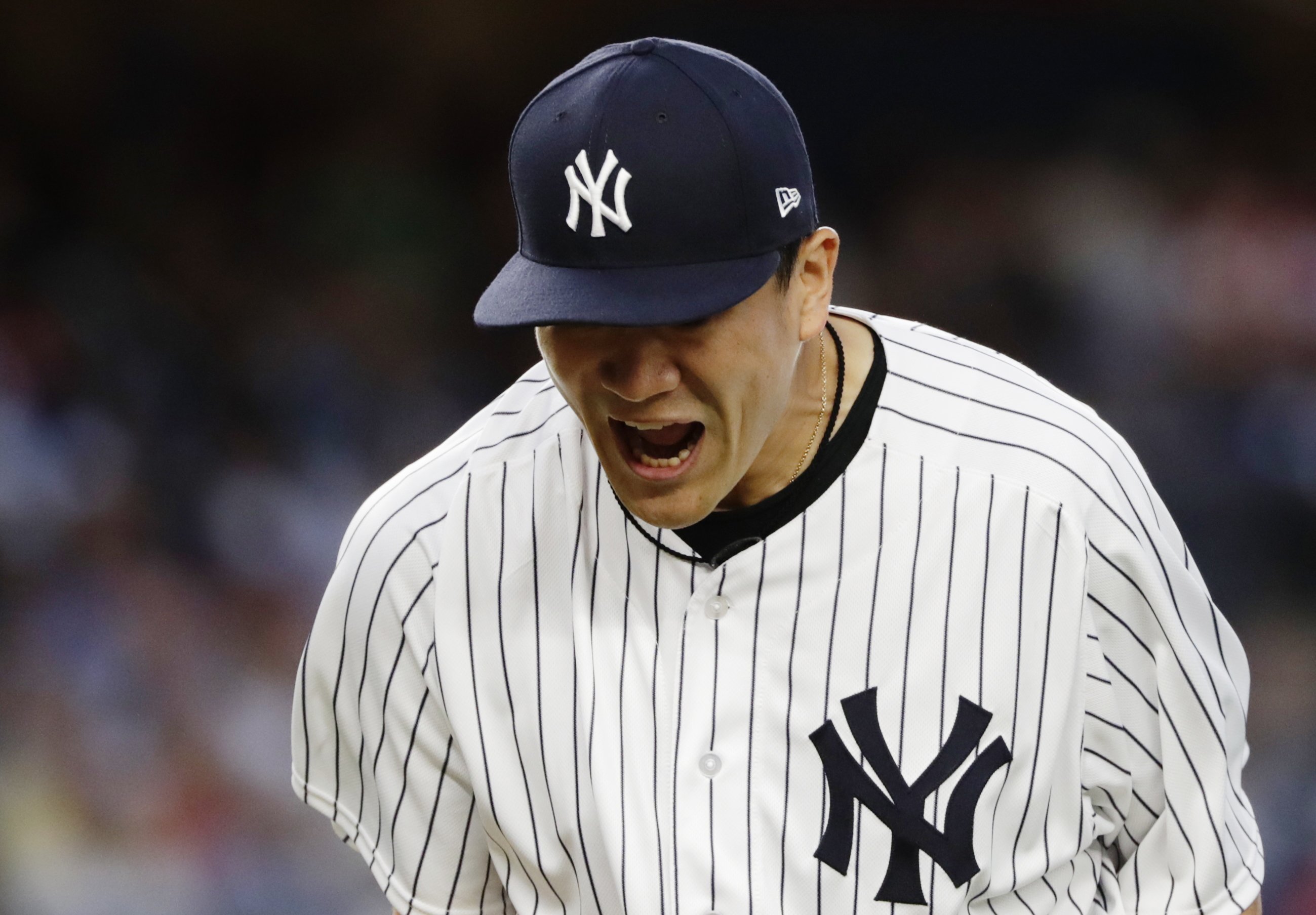 Tanaka llega a 13 juegos sin perder al vencer a Orioles | AP News