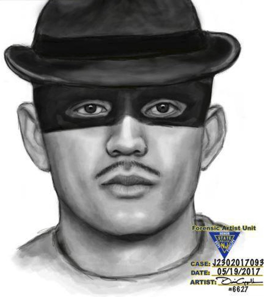 Police: Man wearing fedora, mask over eyes breaks into home | AP News