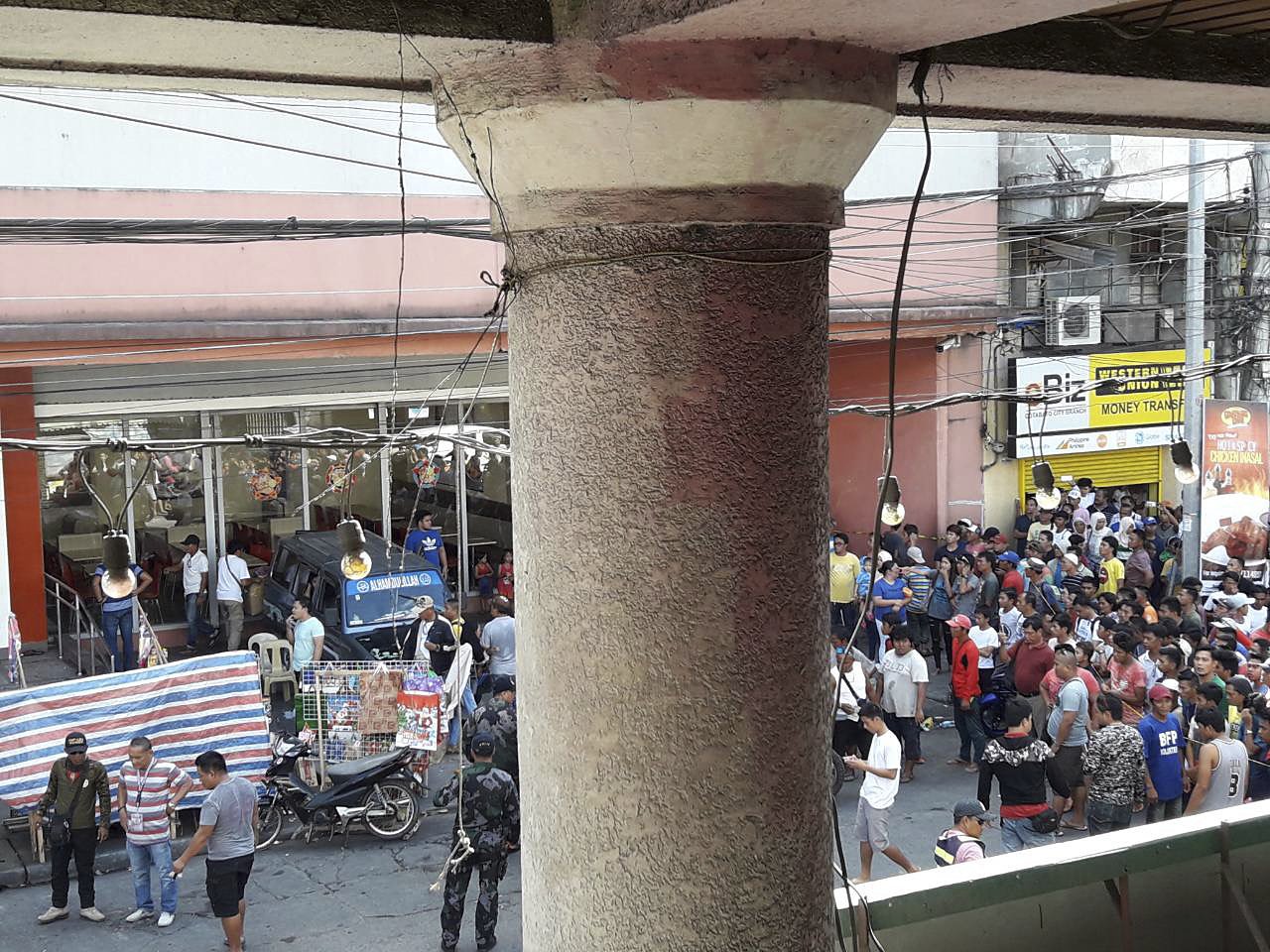 2 dead, nearly 30 wounded in bomb blast at Philippine mall | AP News