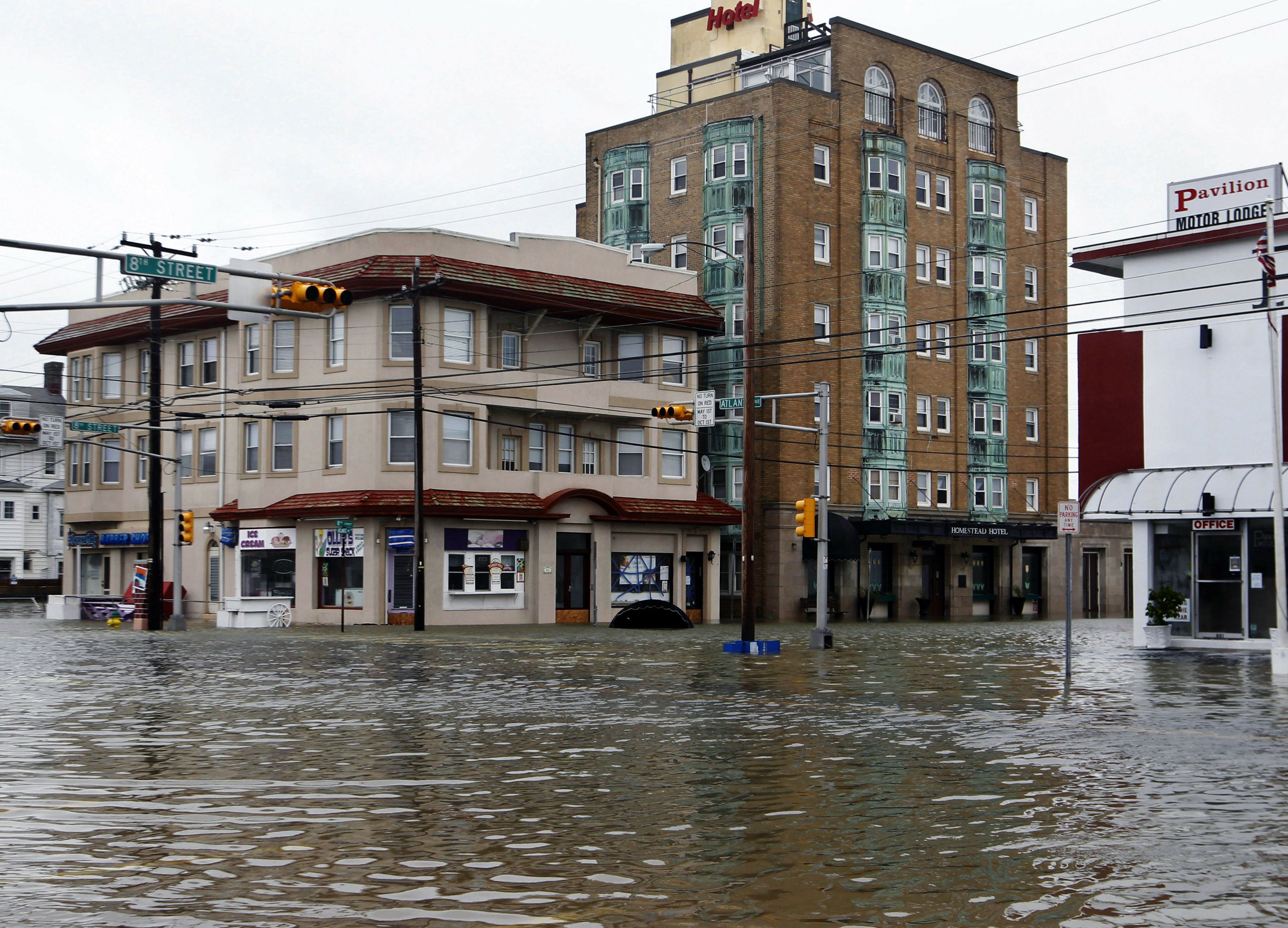 Satellites show warming is accelerating sea level rise | AP News