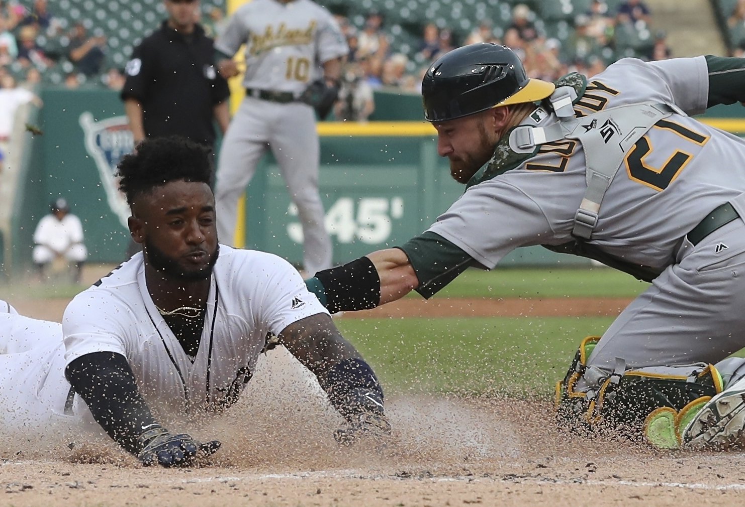 Veteran catcher Lucroy finalizes 1-year deal with Angels | AP News