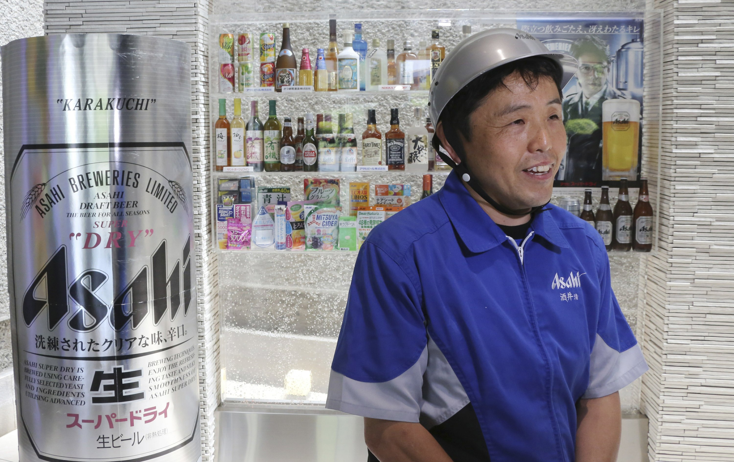 Reverence for robots: Japanese workers treasure automation | AP News