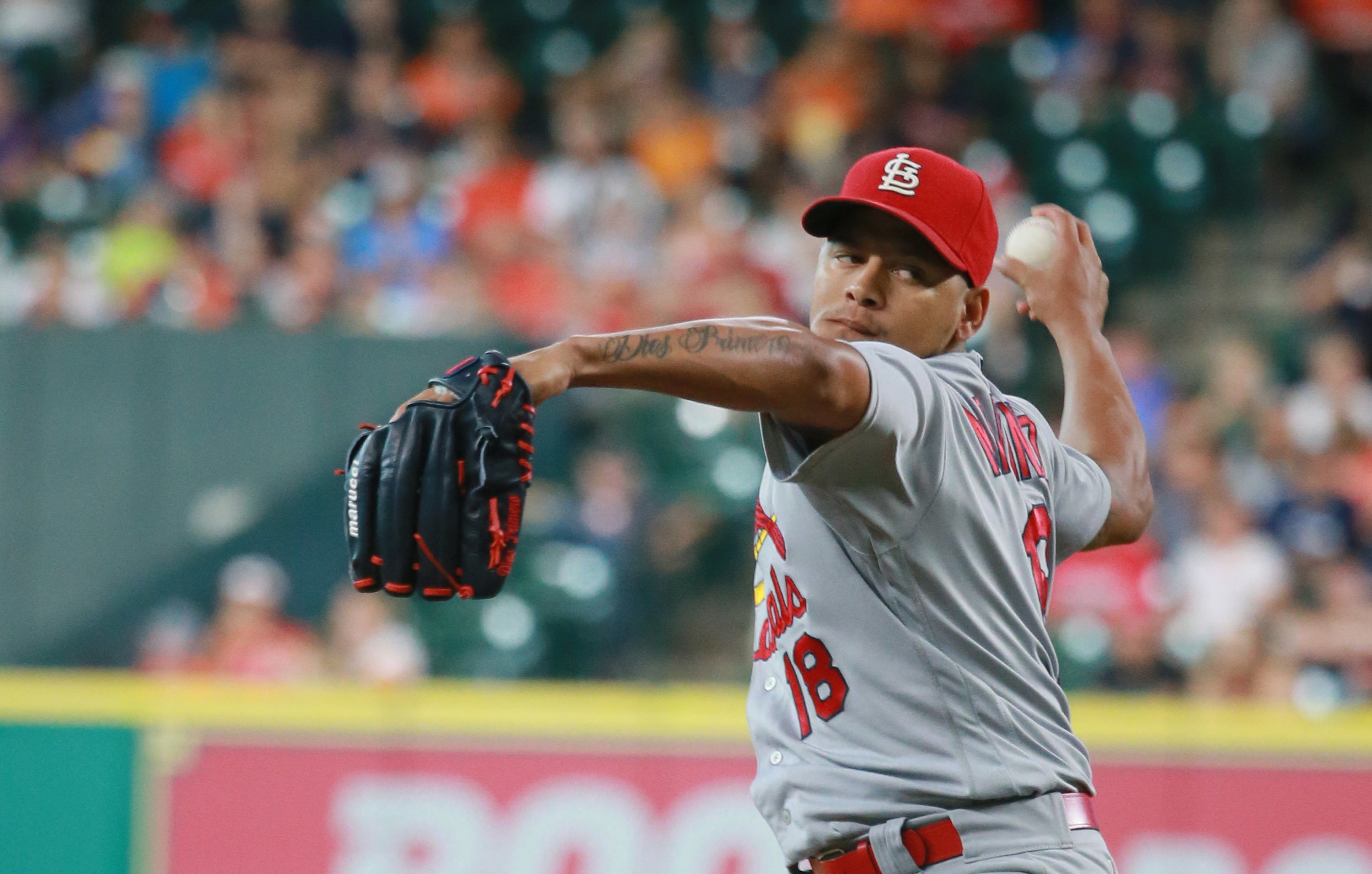 Martinez dominates over 7 innings, Cardinals beat Astros 8-2 | AP News