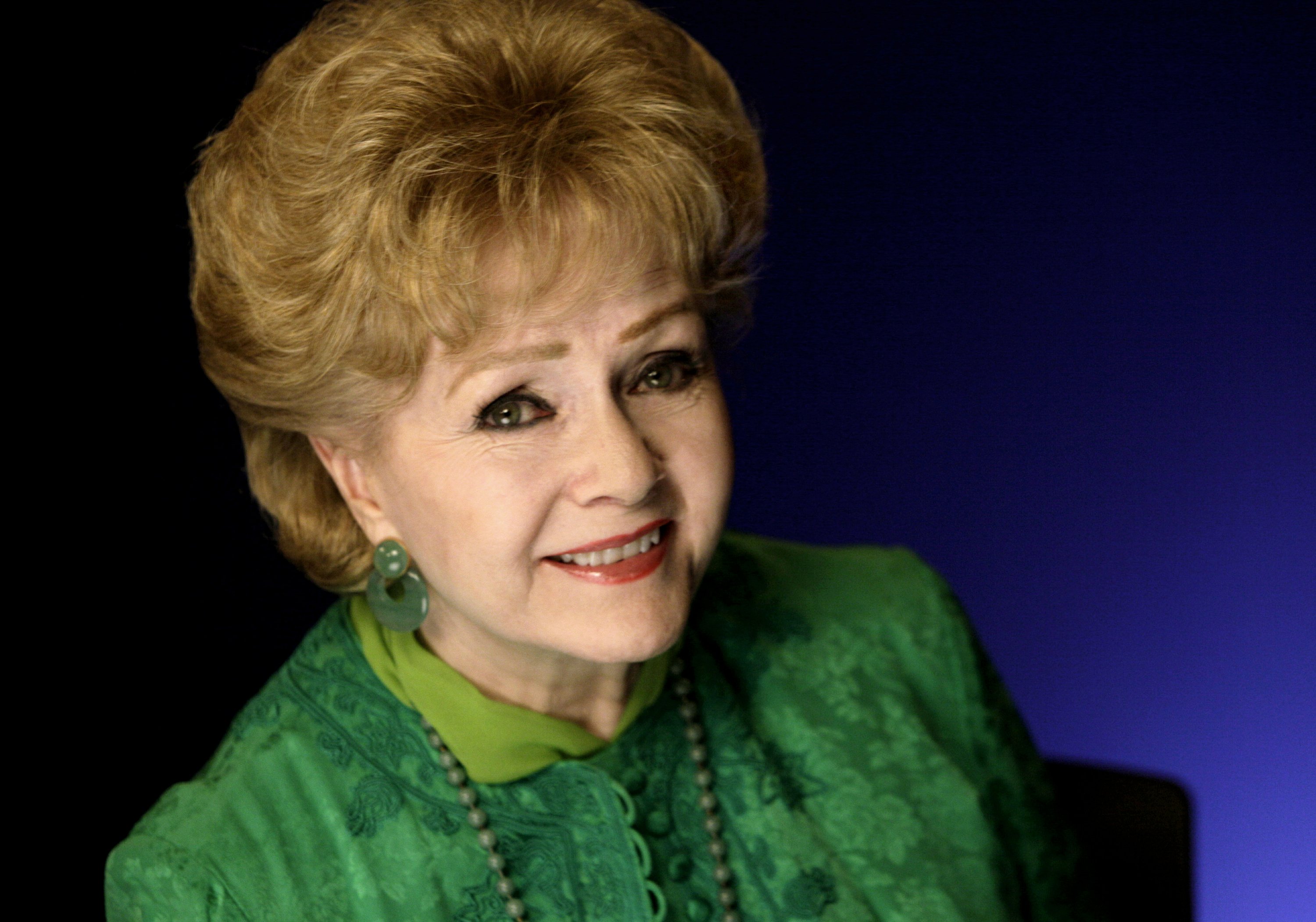 Actress Debbie Reynolds, 84, dies a day after daughter | AP News