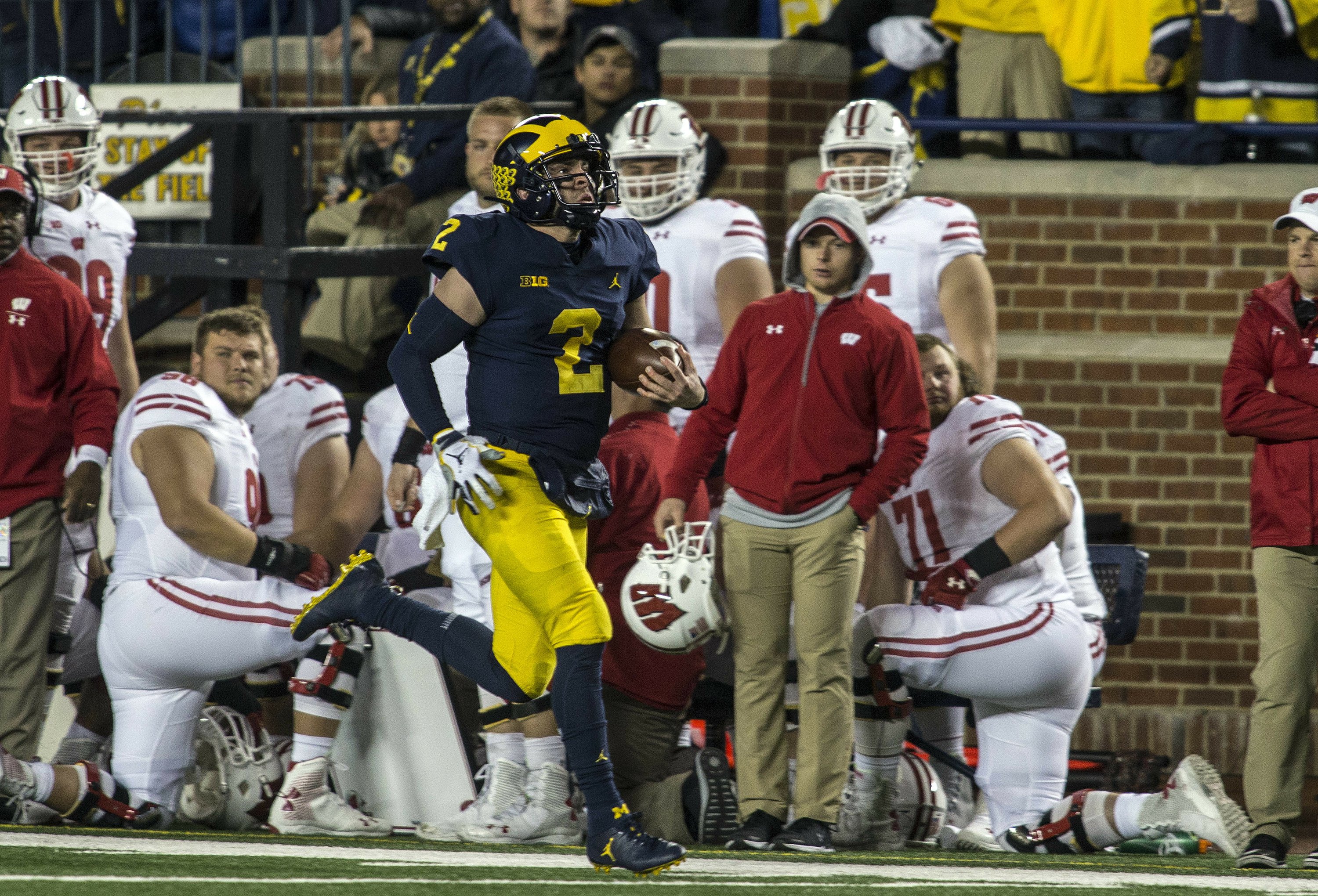 Patterson-led No. 12 Michigan routs No. 15 Wisconsin 38-13 | AP News
