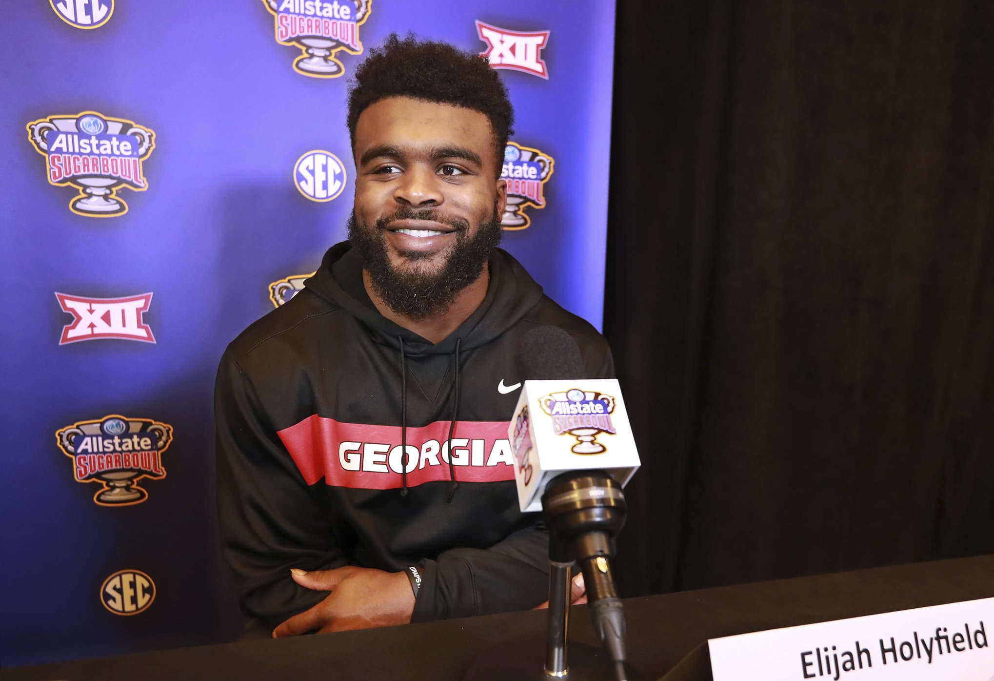 Holyfield's 40 times make NFL draft decision a big gamble | AP News