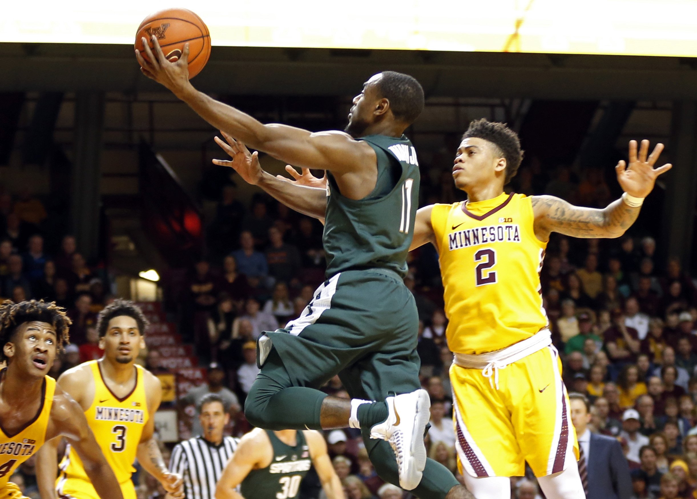 Ellis, Spartans surge back for 75-74 win over Gophers in OT | AP News