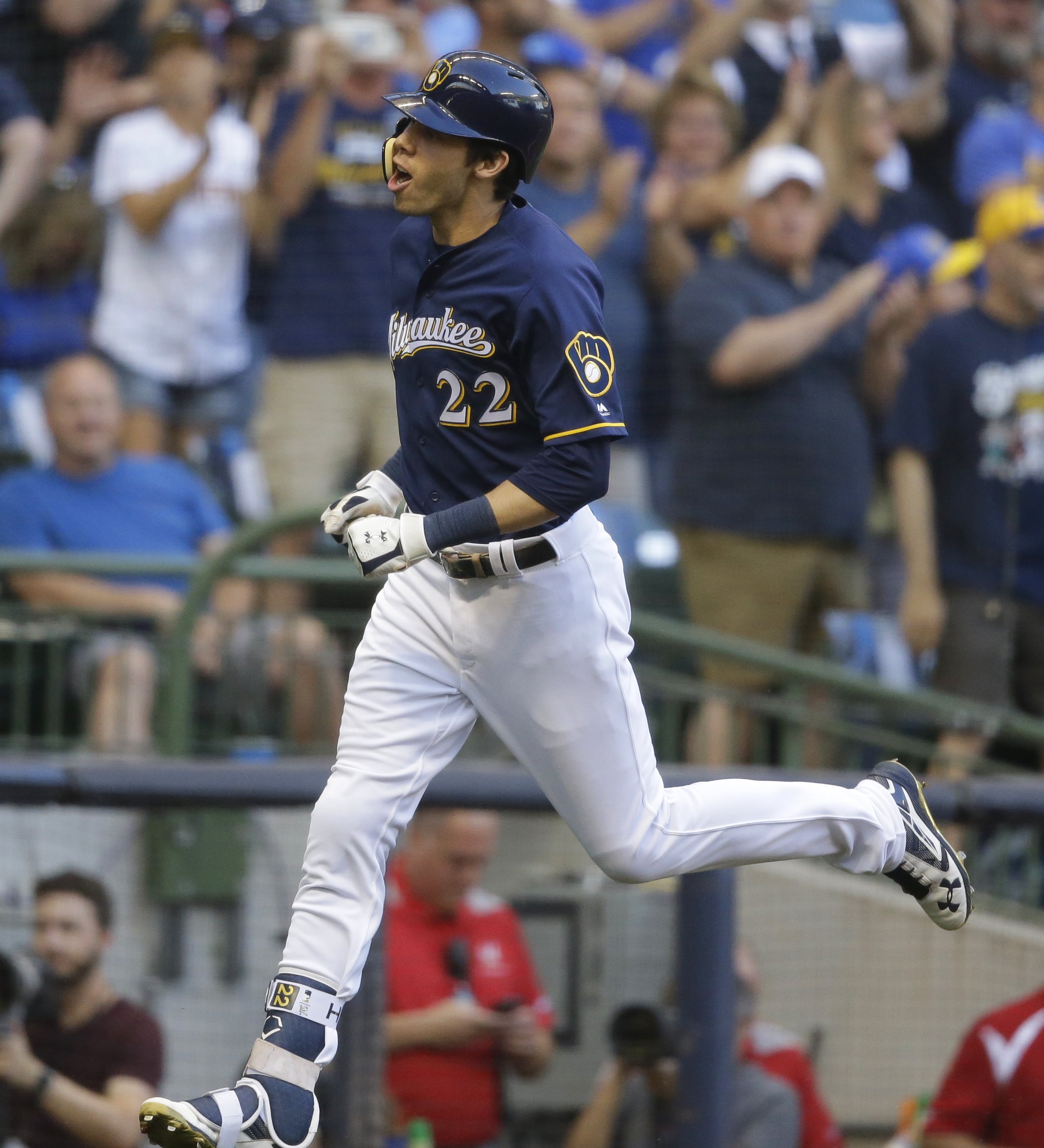 Yelich has Brewers closing in on postseason spot | AP News