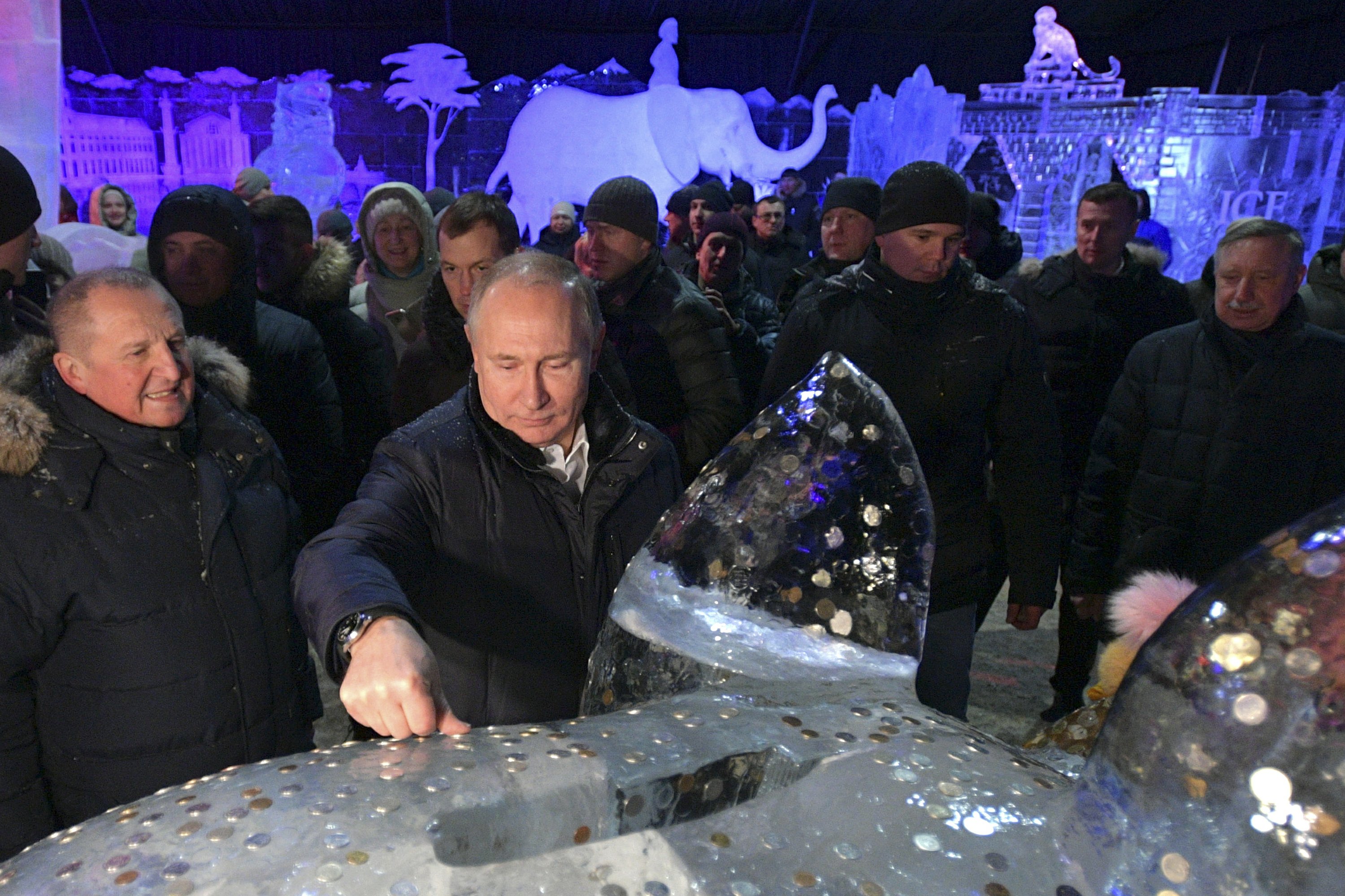 Putin gets to fire cannon at Russian Christmas | AP News