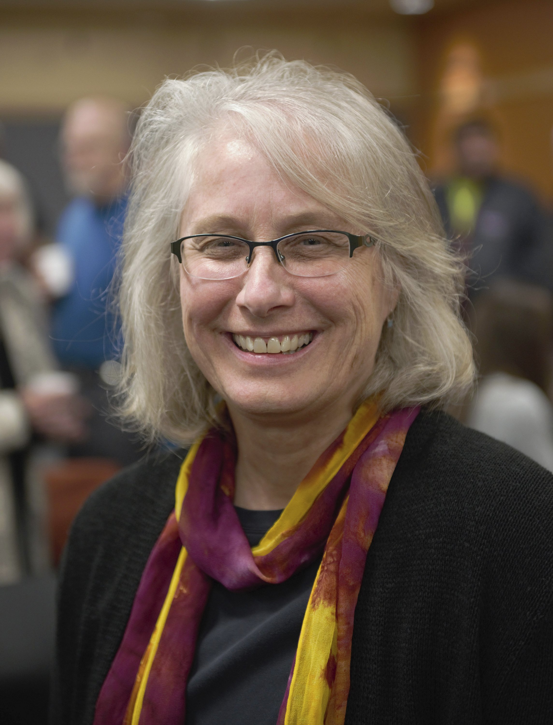 New librarian finds long trail leads to Sitka | AP News