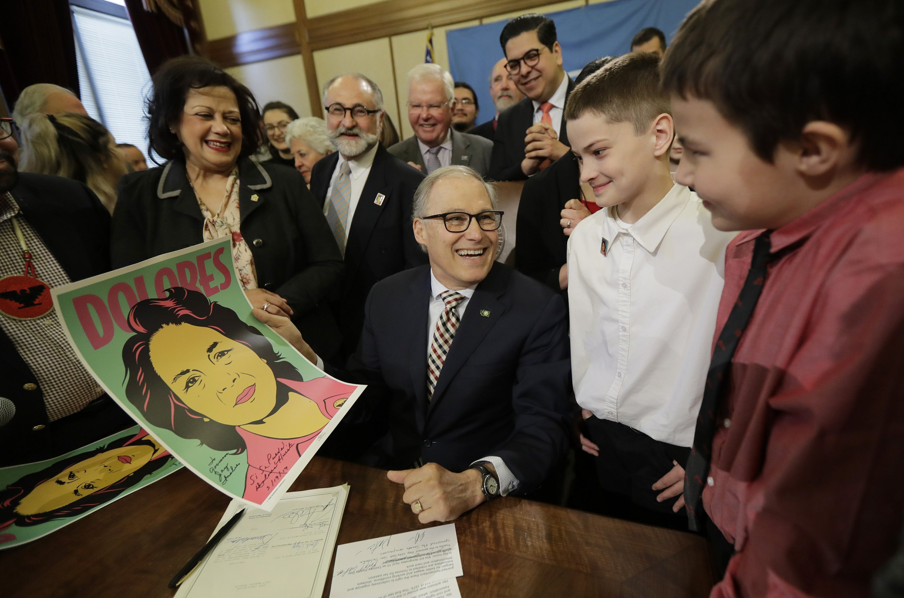 Washington Gov. Jay Inslee signs "Dolores Huerta Day" bill | AP News