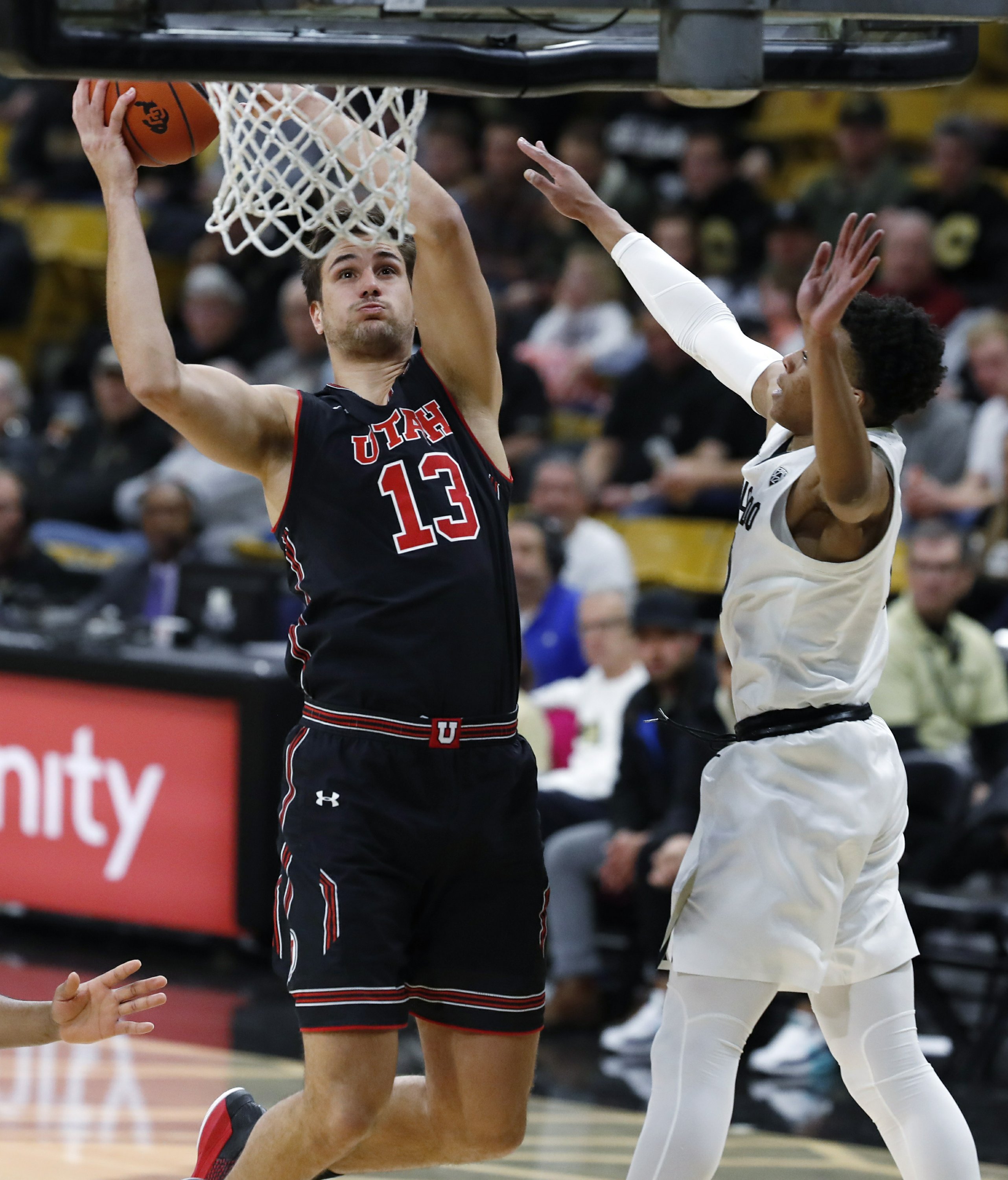 Bey's double-double leads Colorado past Utah 71-63 | AP News