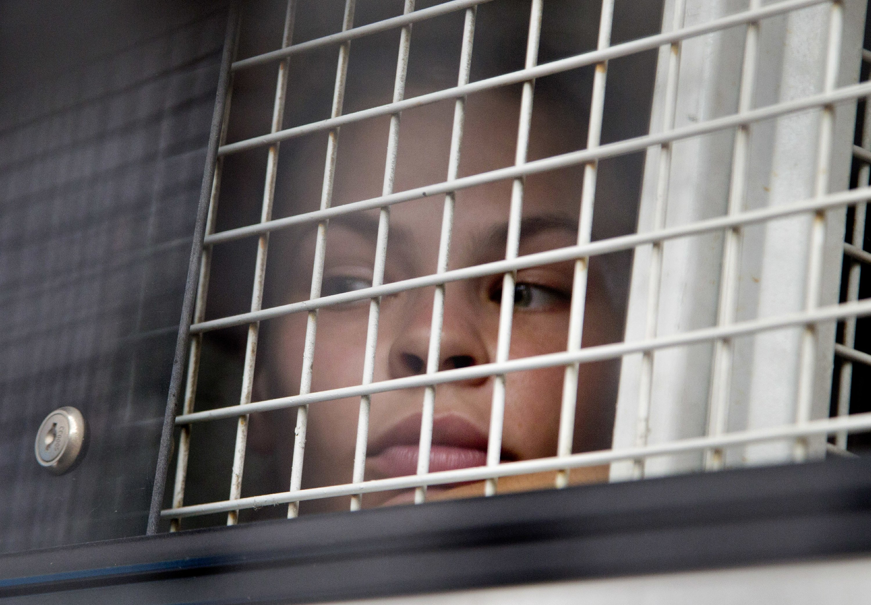 Russian sex guru, follower blame US for continued detention | AP News