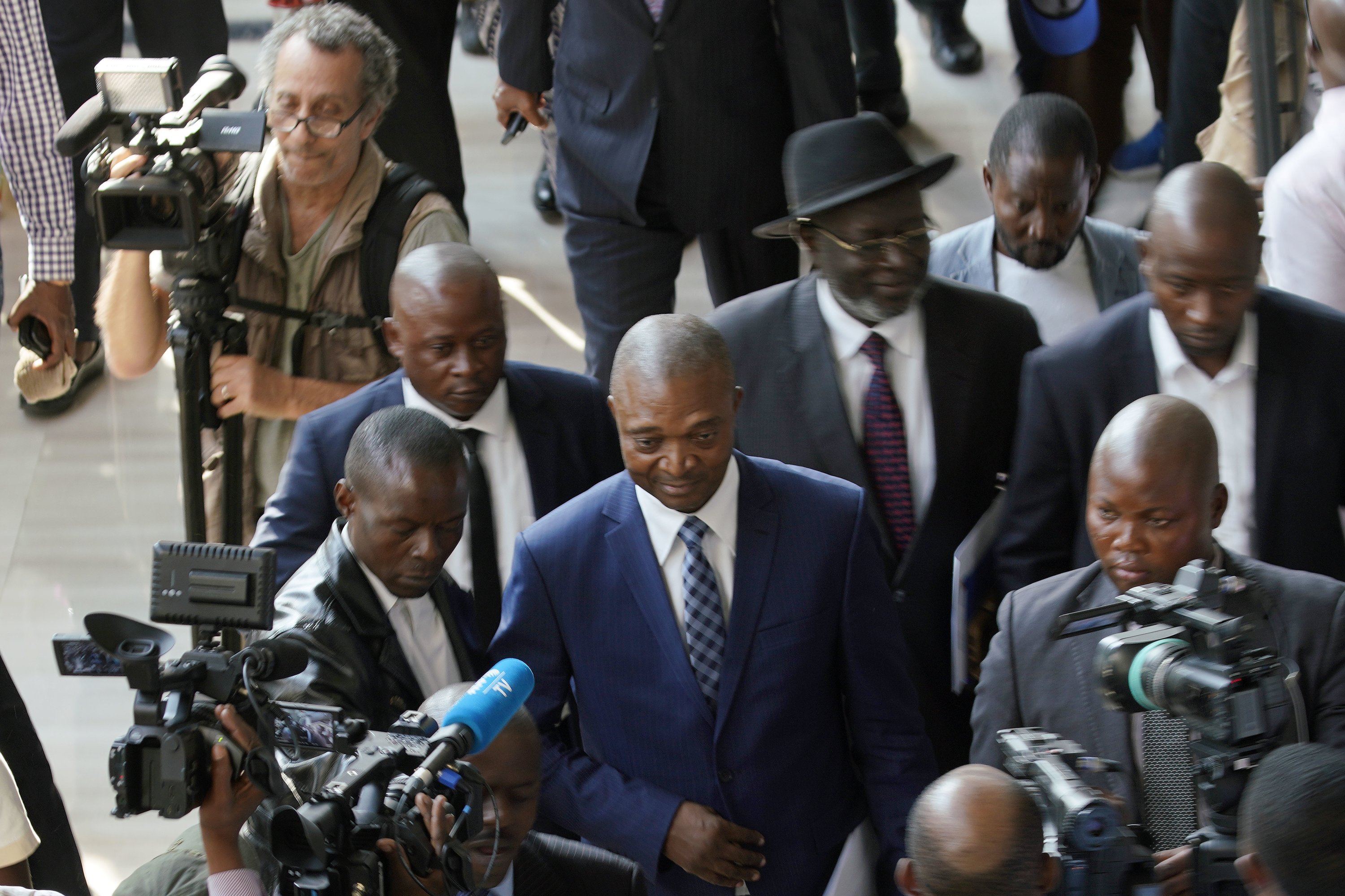 Congo on Sunday faces a troubled, long-delayed election | AP News
