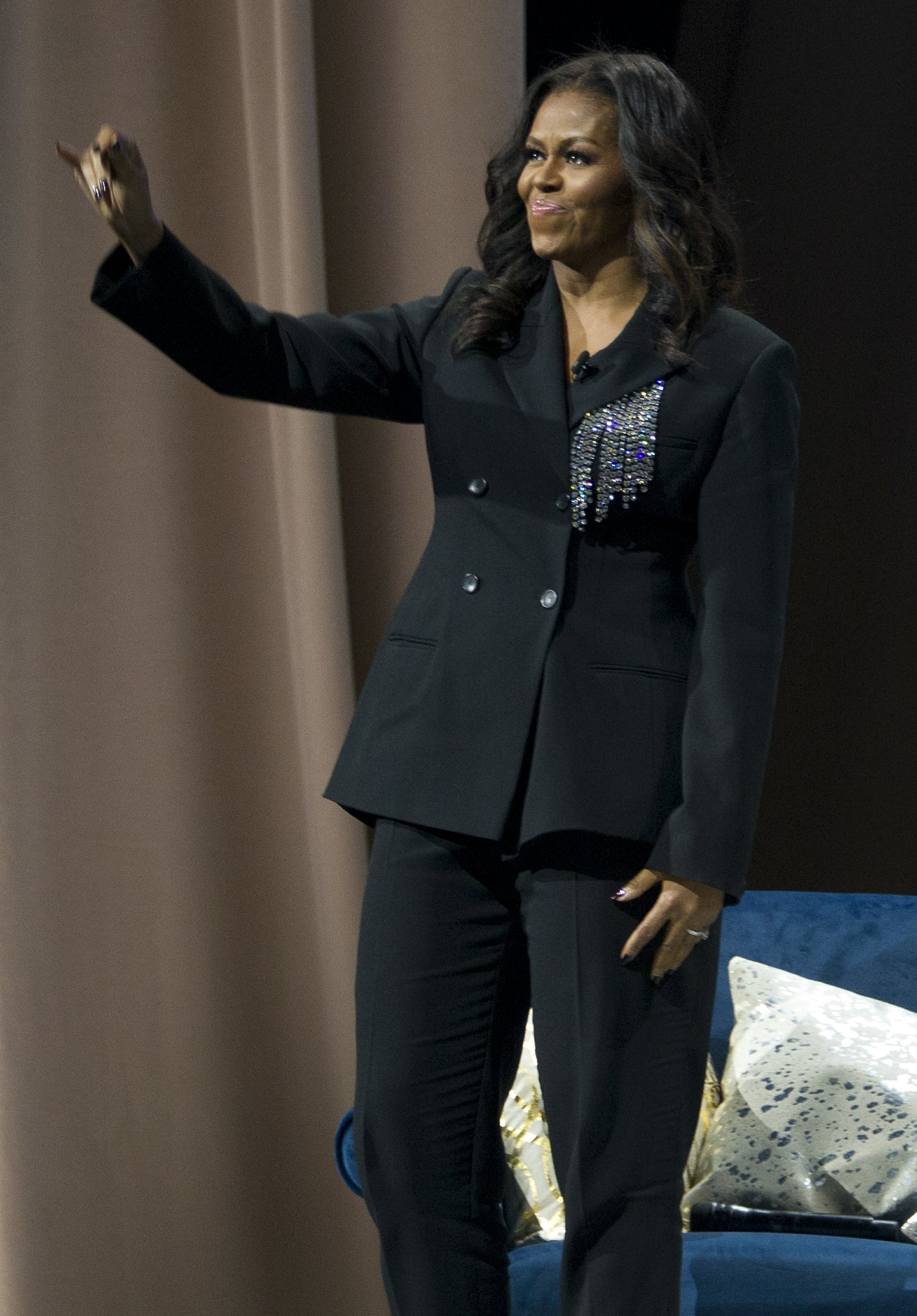 Barack Obama surprise guest at Michelle Obama's book show | AP News