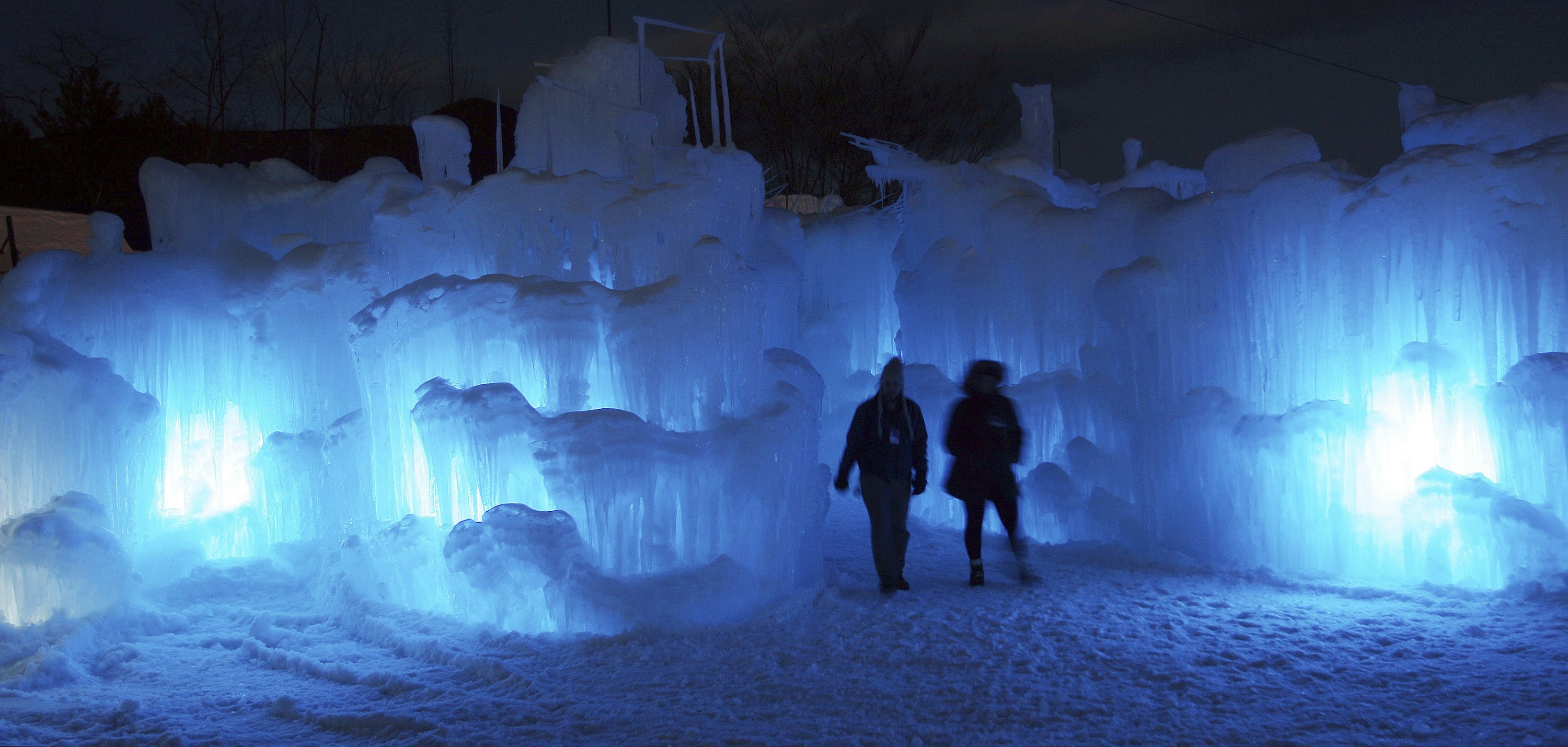Hand-crafted ice castles opening for exploration | AP News