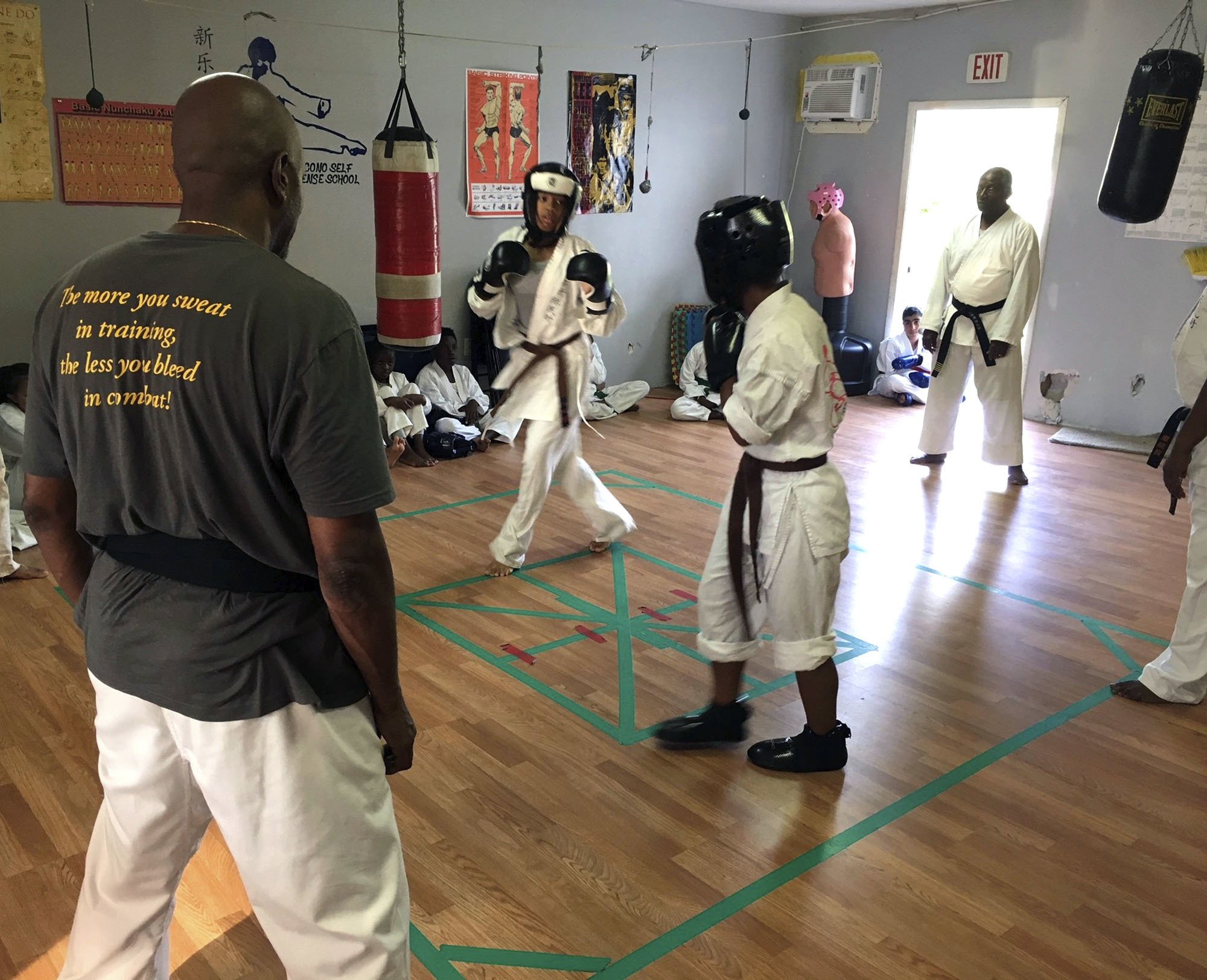 Karate school gives back to community | AP News