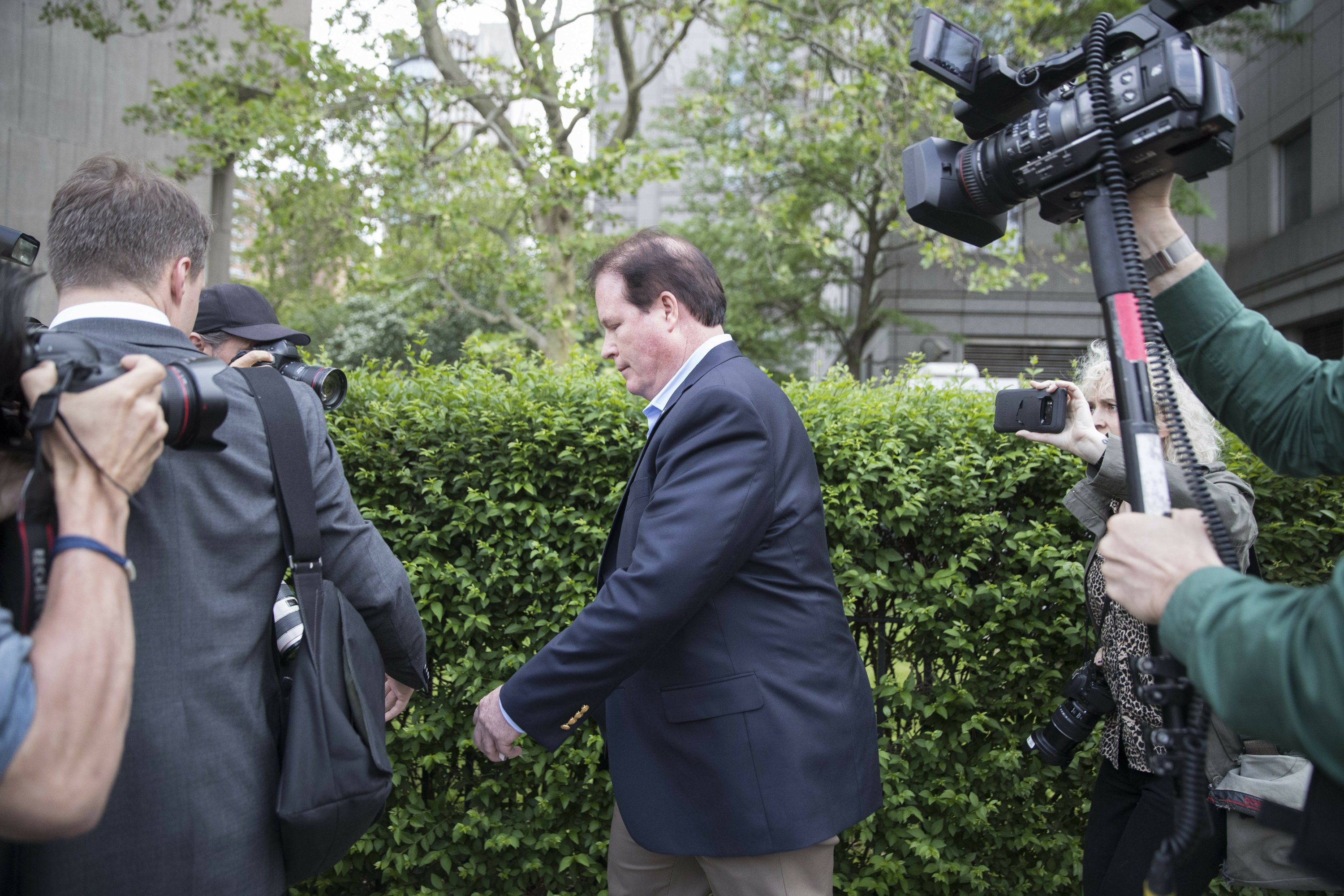 Bank CEO pleads not guilty in bid to get Trump post | AP News