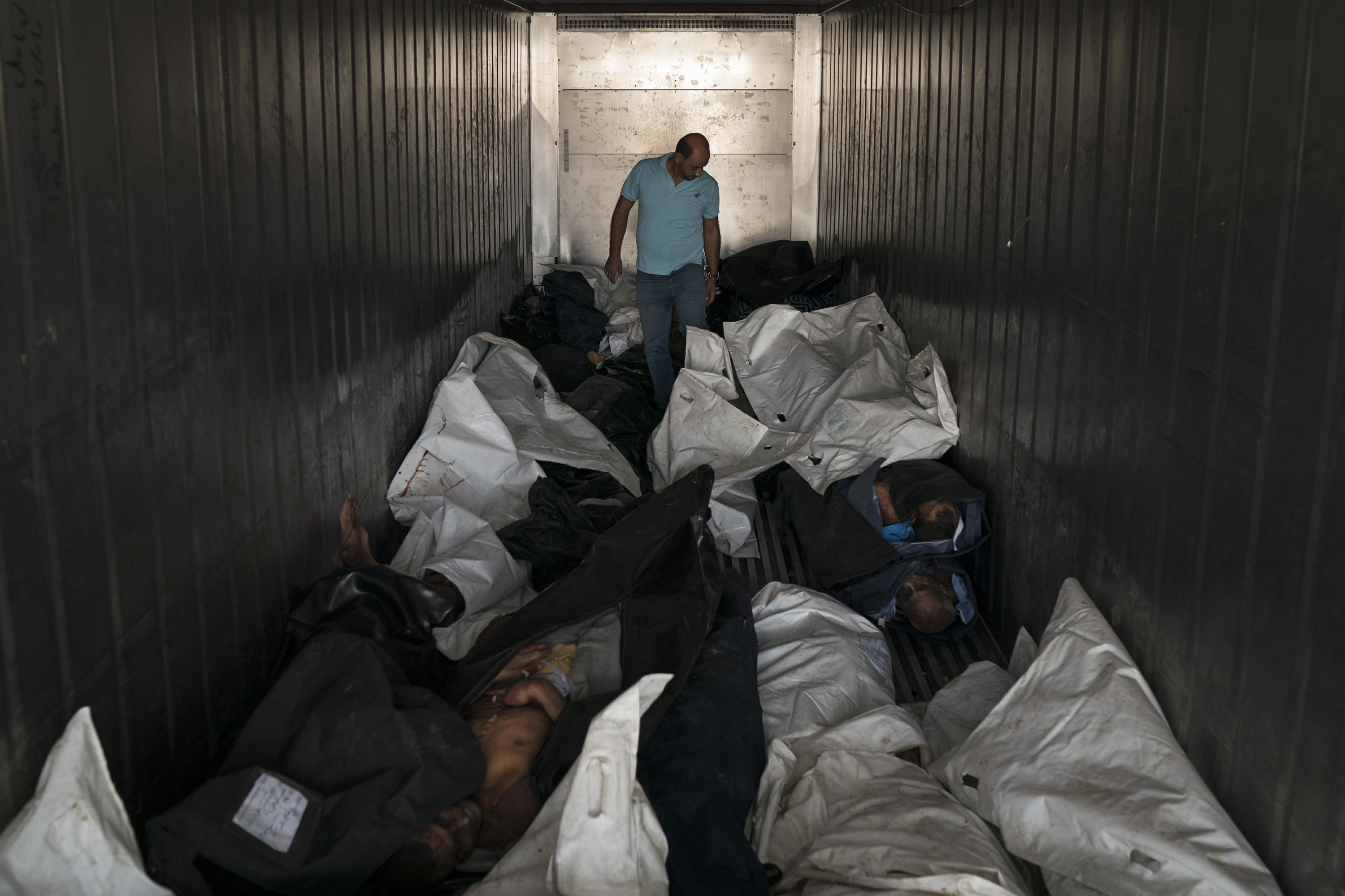 Mosul's morgue men sought glimmer of humanity amid atrocity | AP News