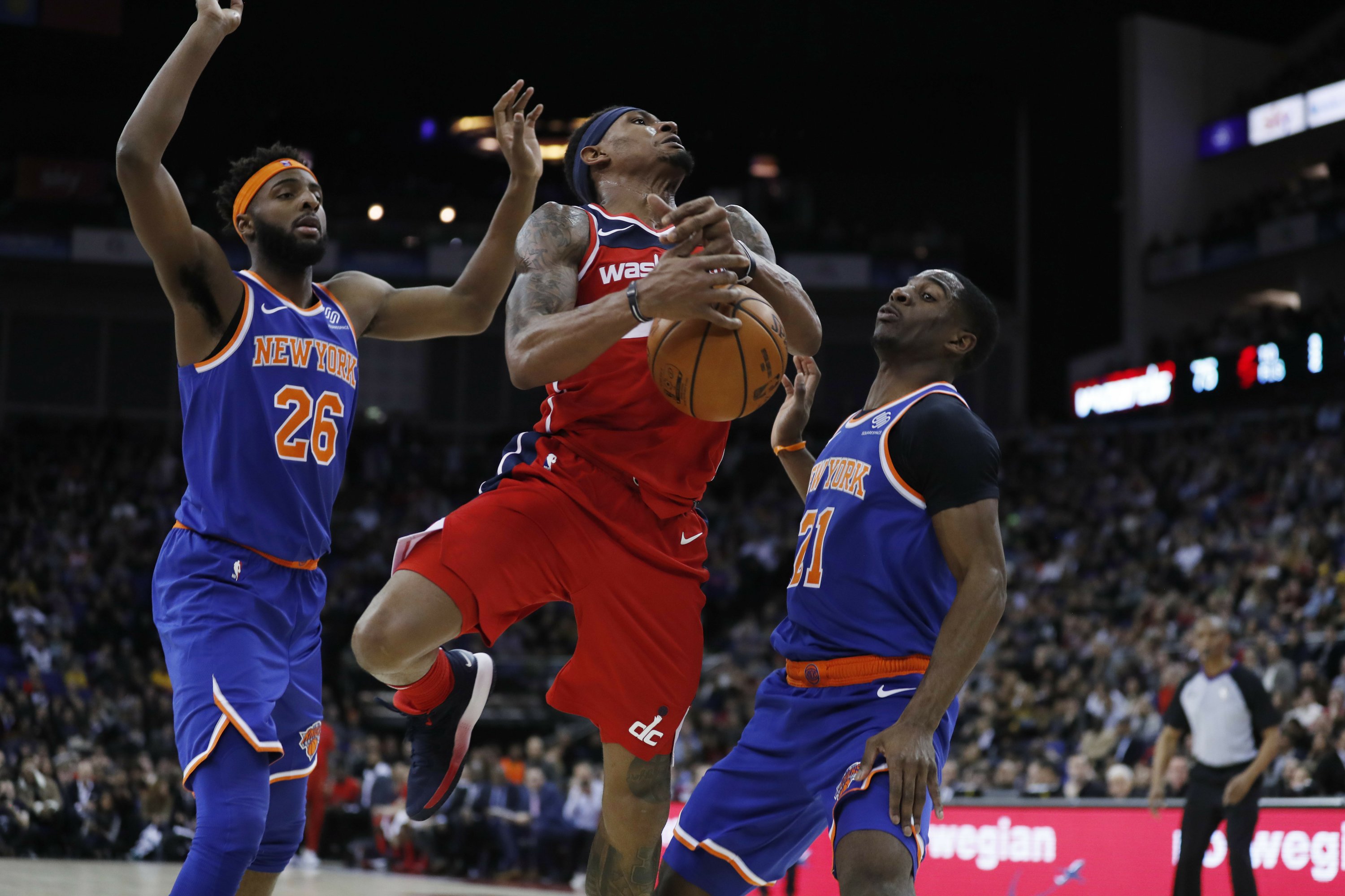 Knicks' last-second goaltend gives Wizards win in London | AP News
