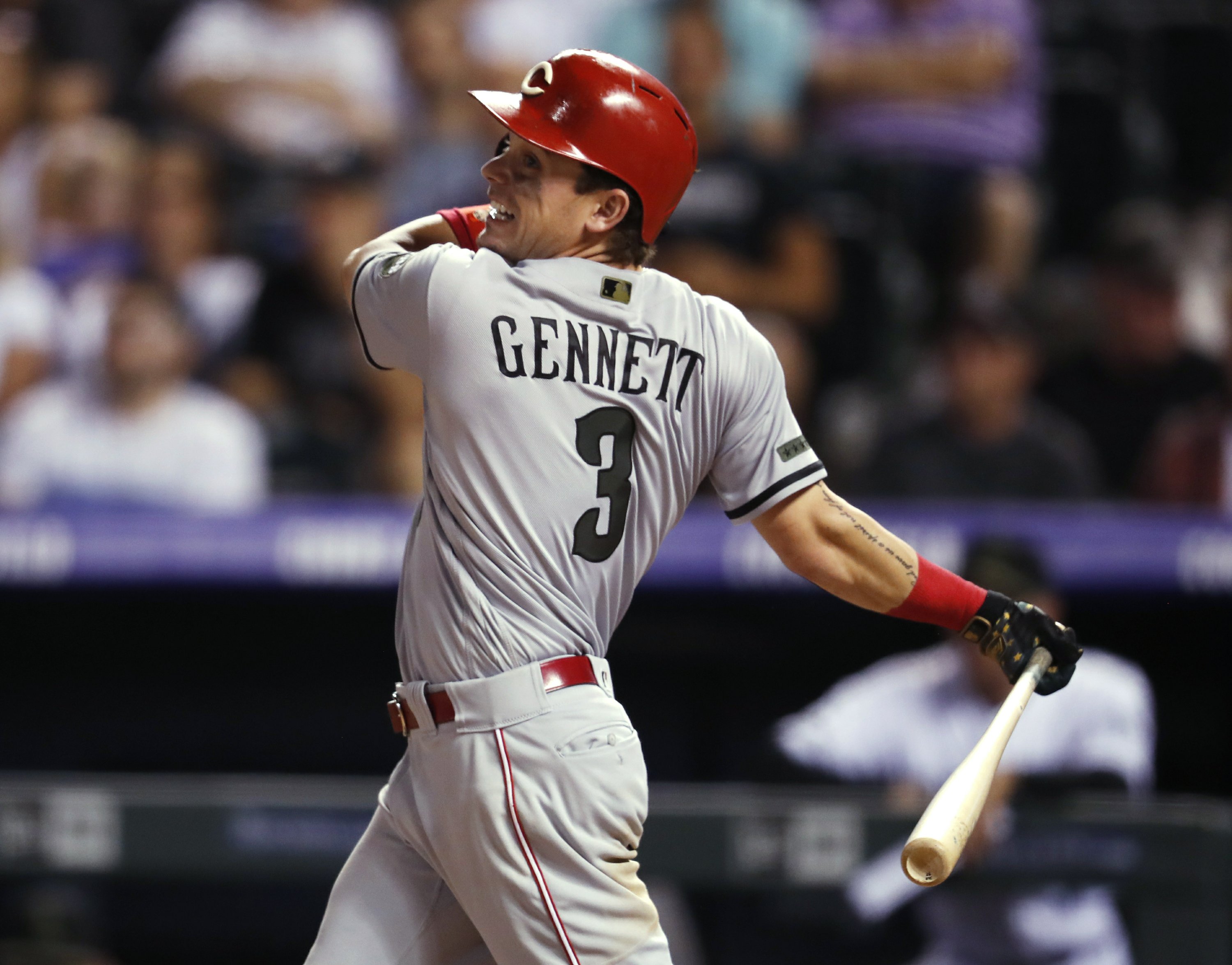 Gennett has 5 hits to lead Reds over Rockies 6-5. | AP News