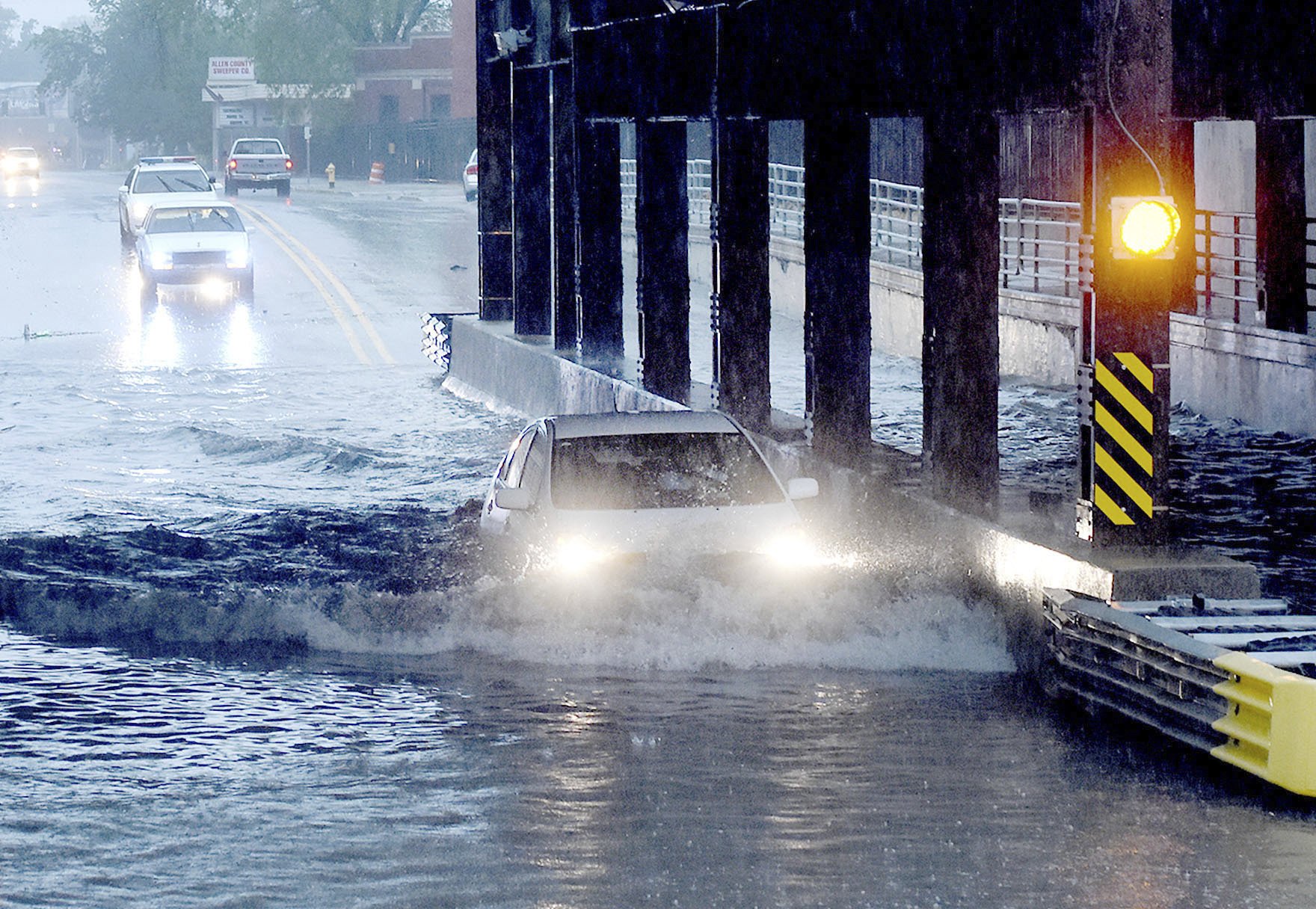 Heavy rains spark flash flooding, evacuations in Fort Wayne | AP News